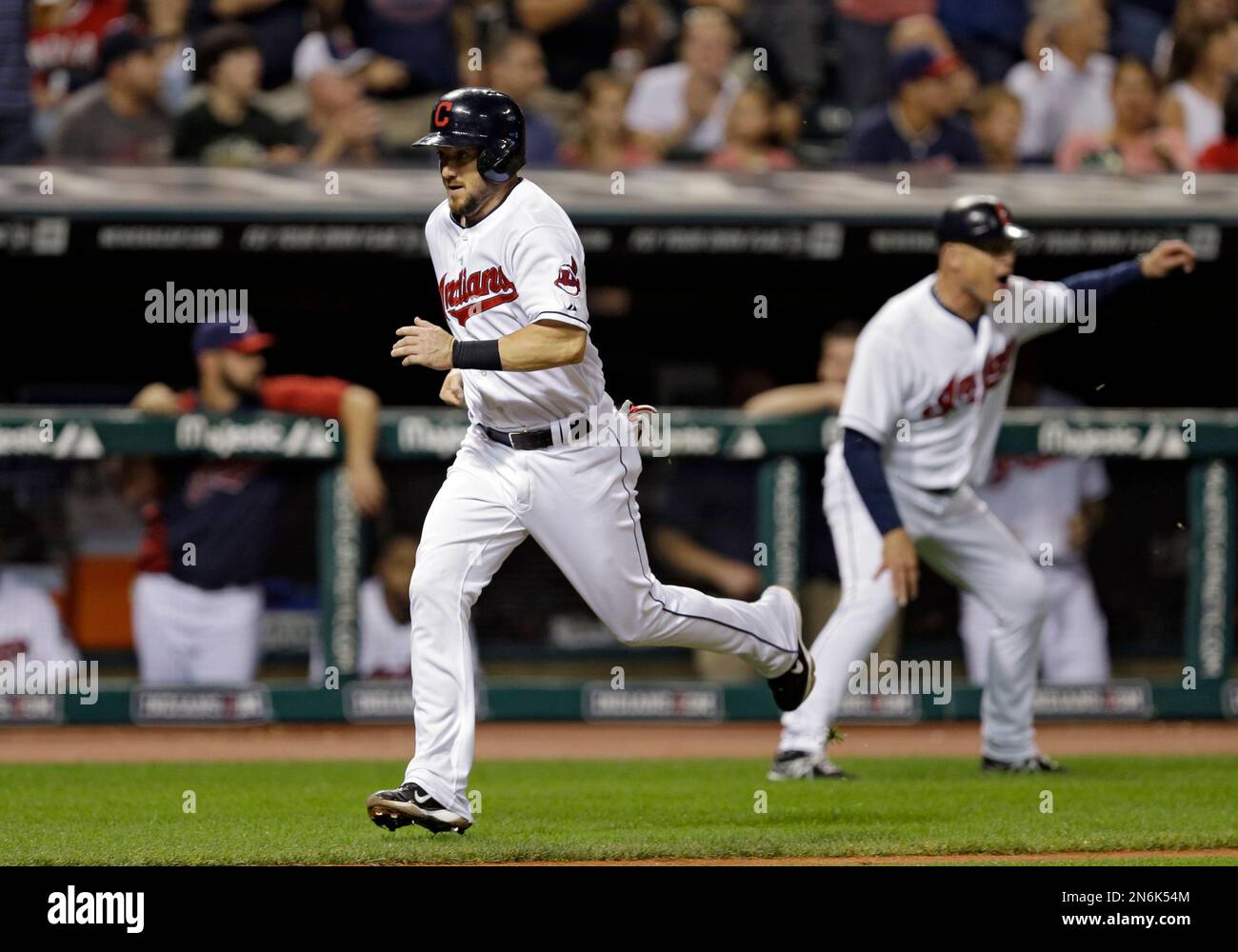 Cleveland Indians' Ryan Raburn races home to score on a throwing error ...