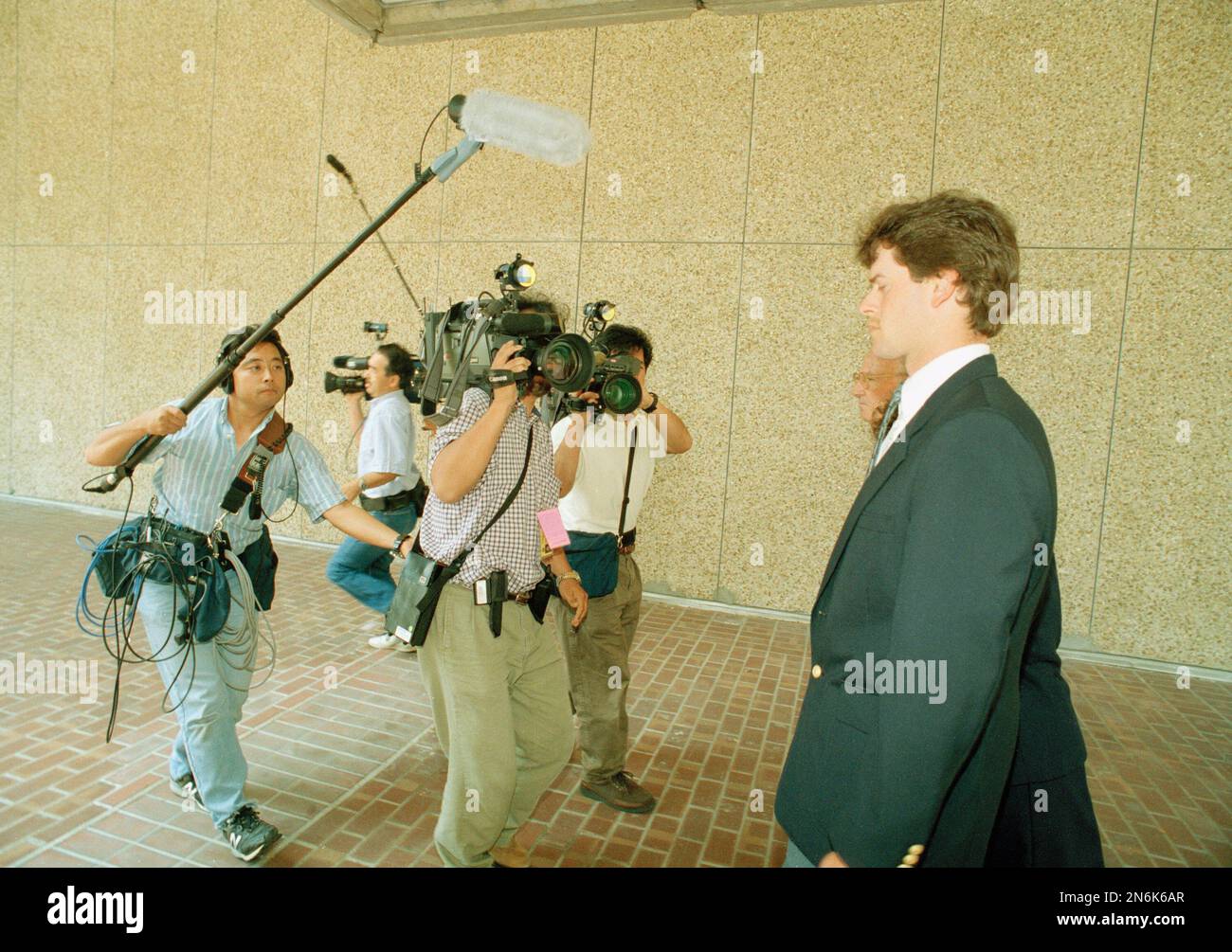 Rodney Peairs with TV crews at the East Baton Rouge Parish Courthouse ...