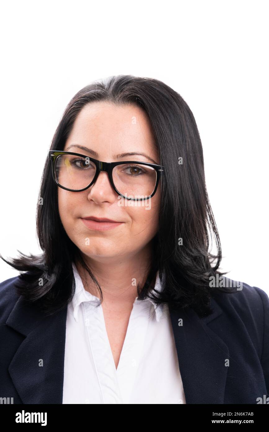 Close Up Portrait Of Friendly Adult Businesswoman Wearing Glasses And Smart Casual Suit As