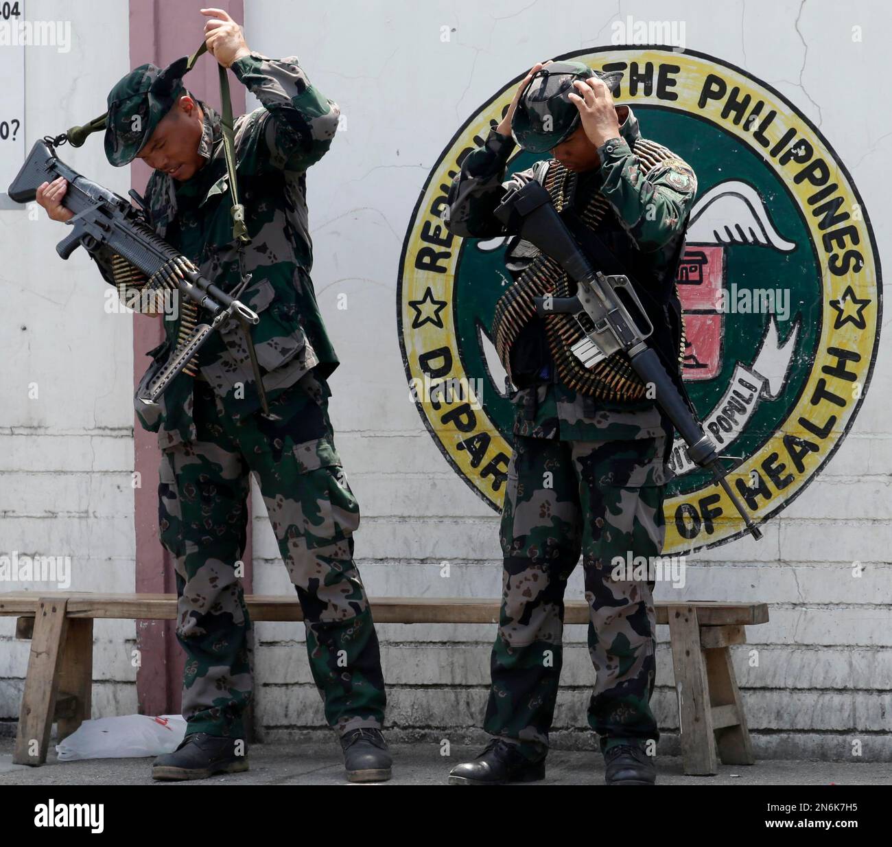 Philippine National Police forces personnel man their posts as ...