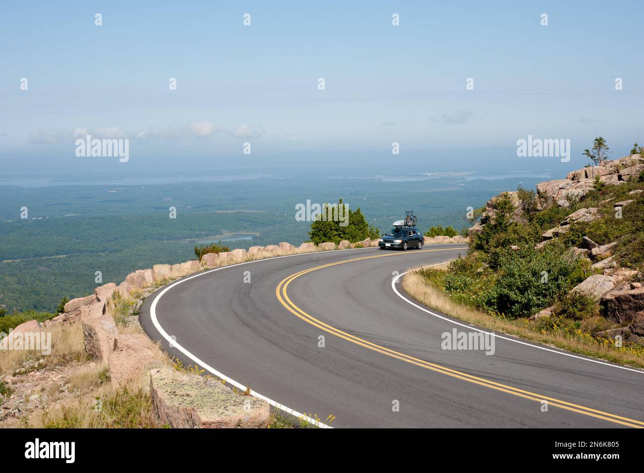 Car driving up Cadillac Mountain drive in Acadia national park, Maine ...