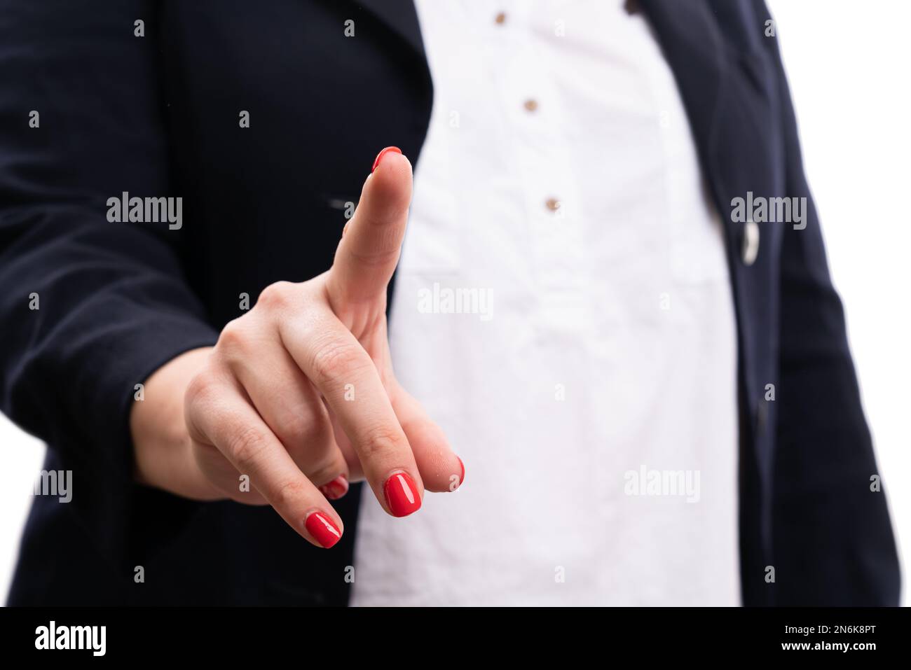 Close-up of female index finger touching invisible display as copyspace ...