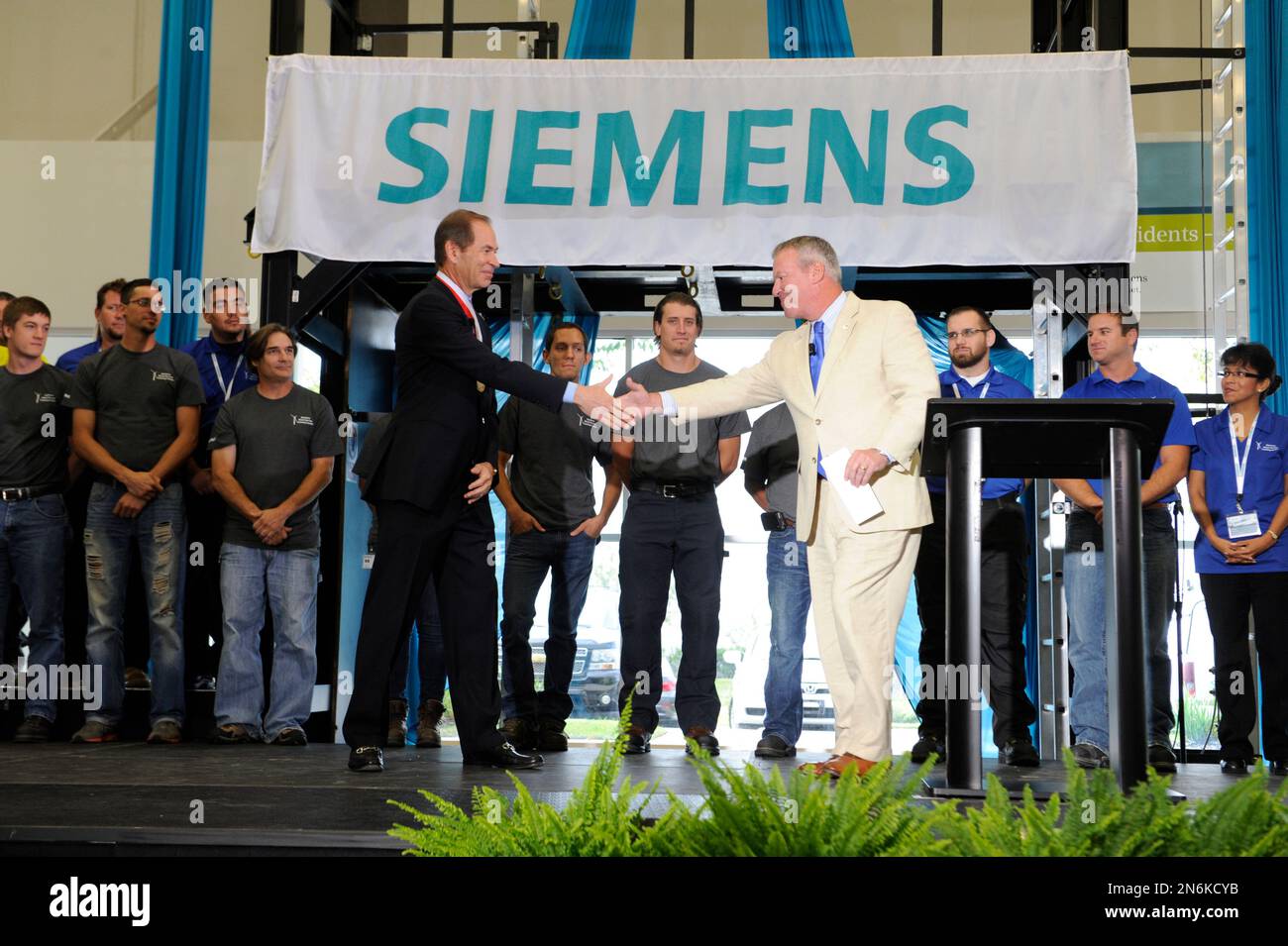 Orlando Mayor Buddy Dyer, right, joins Randy Zwirn, president and CEO ...