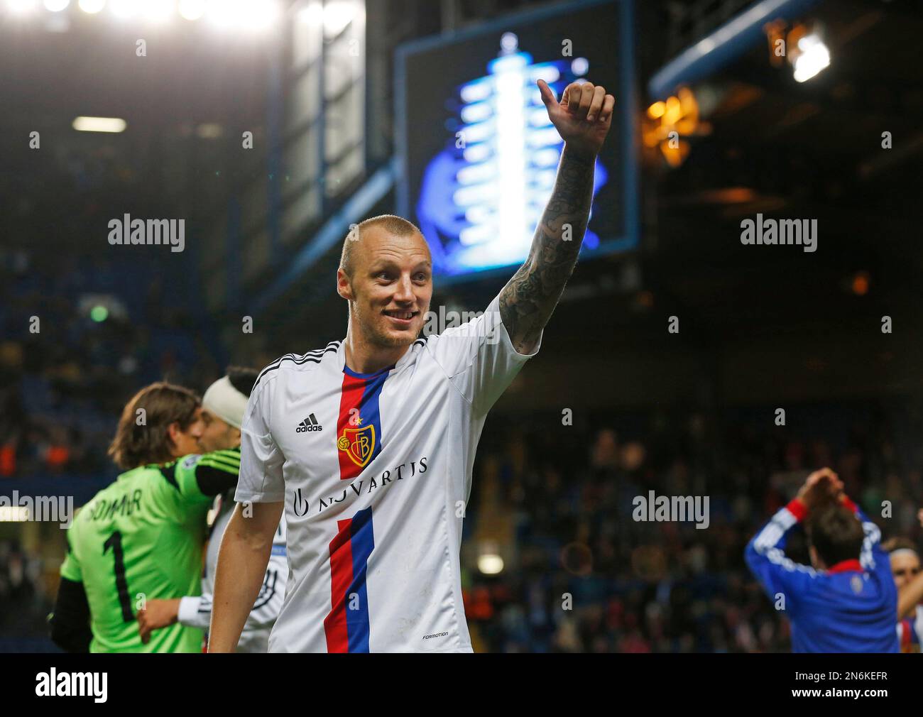 Basel's Ivan Ivanov gestures to spectators after the Champions League ...