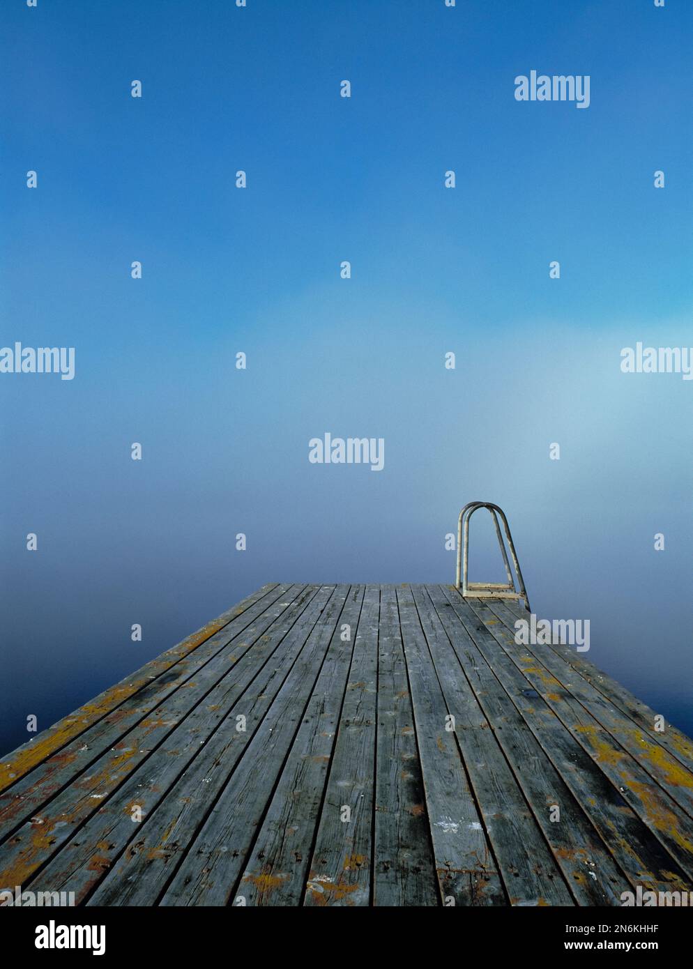 A bathing jetty disappearing into the lifting mist Stock Photo - Alamy