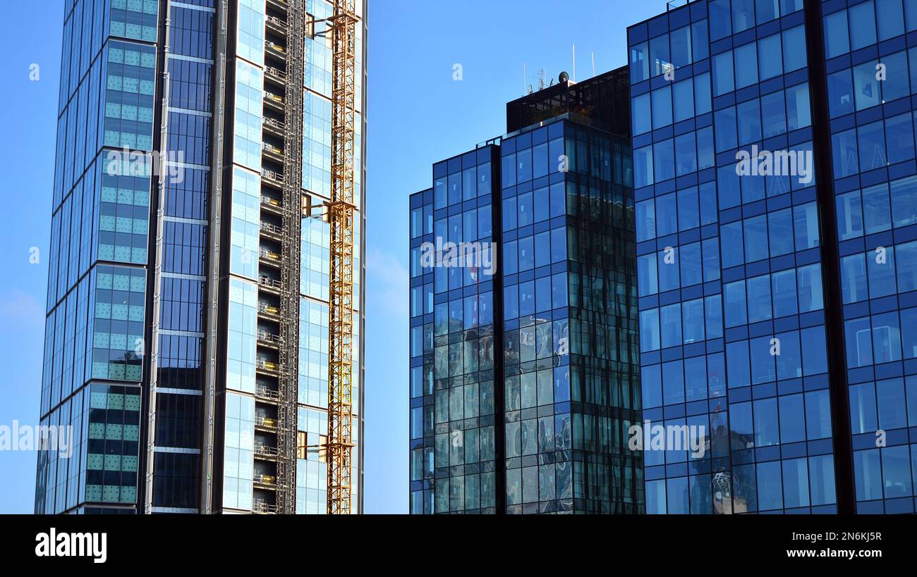 High-rise building under construction. Modern office building Stock ...