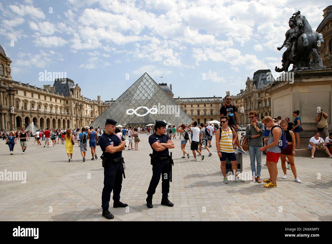 FILE - In this Aug. 2, 2013 file photo French police officers stand ...