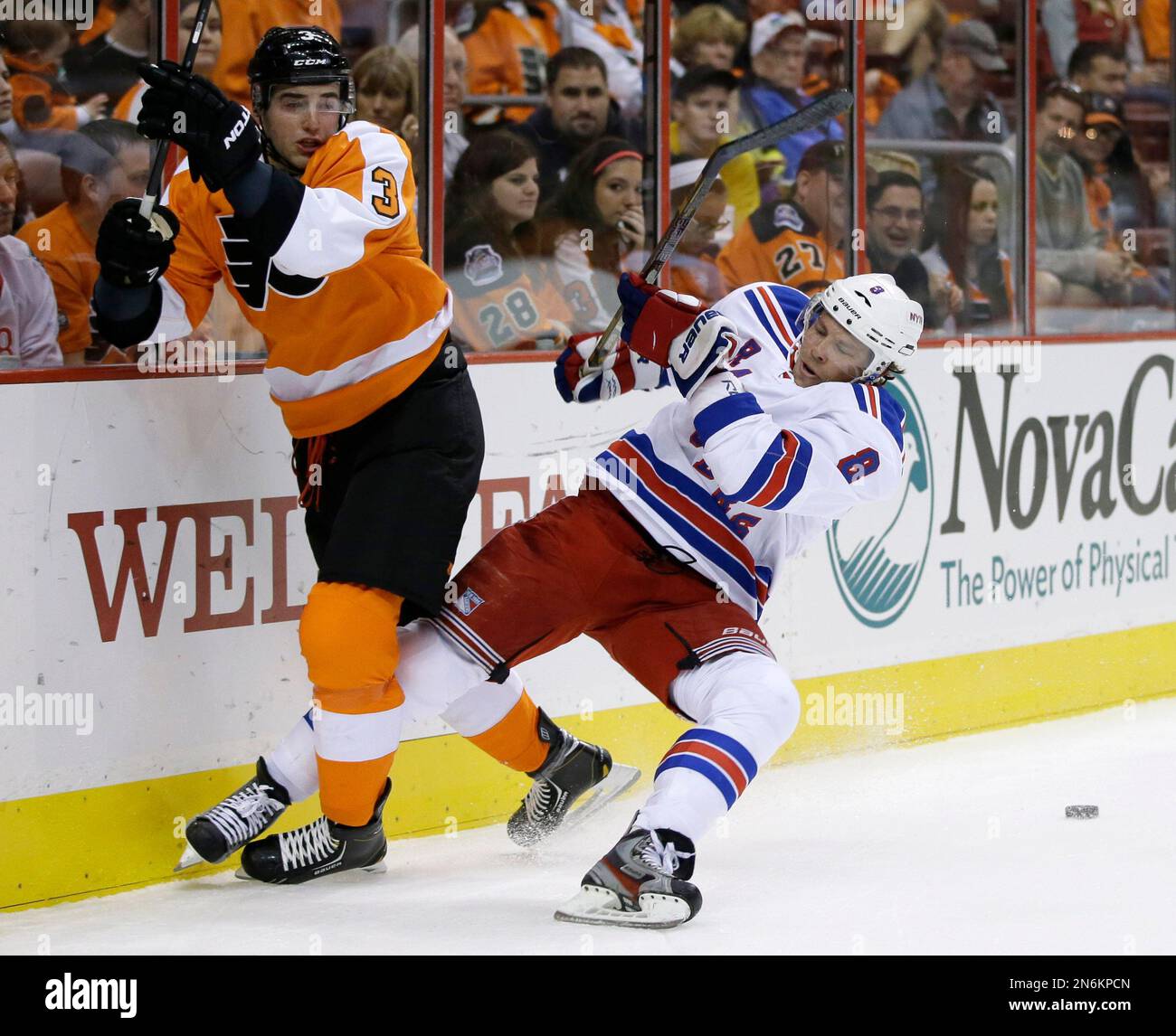 Philadelphia Flyers' Brandon Manning, left, and New York Rangers ...