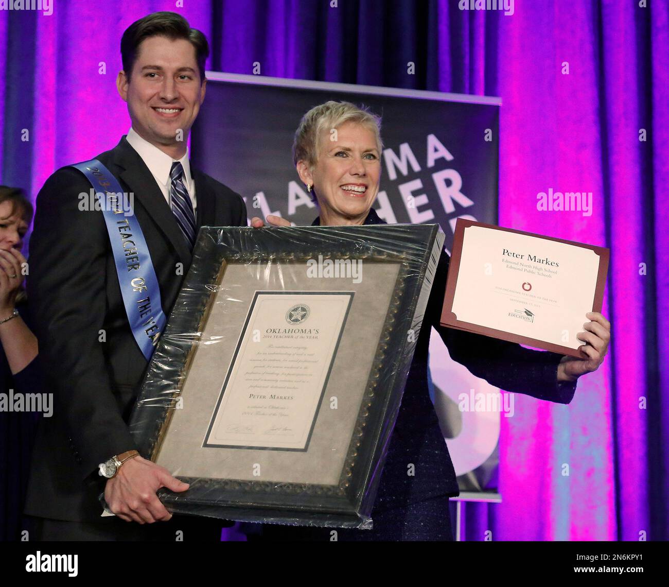 Peter Markes, left, an 8th through 12th grade string orchestra and ...