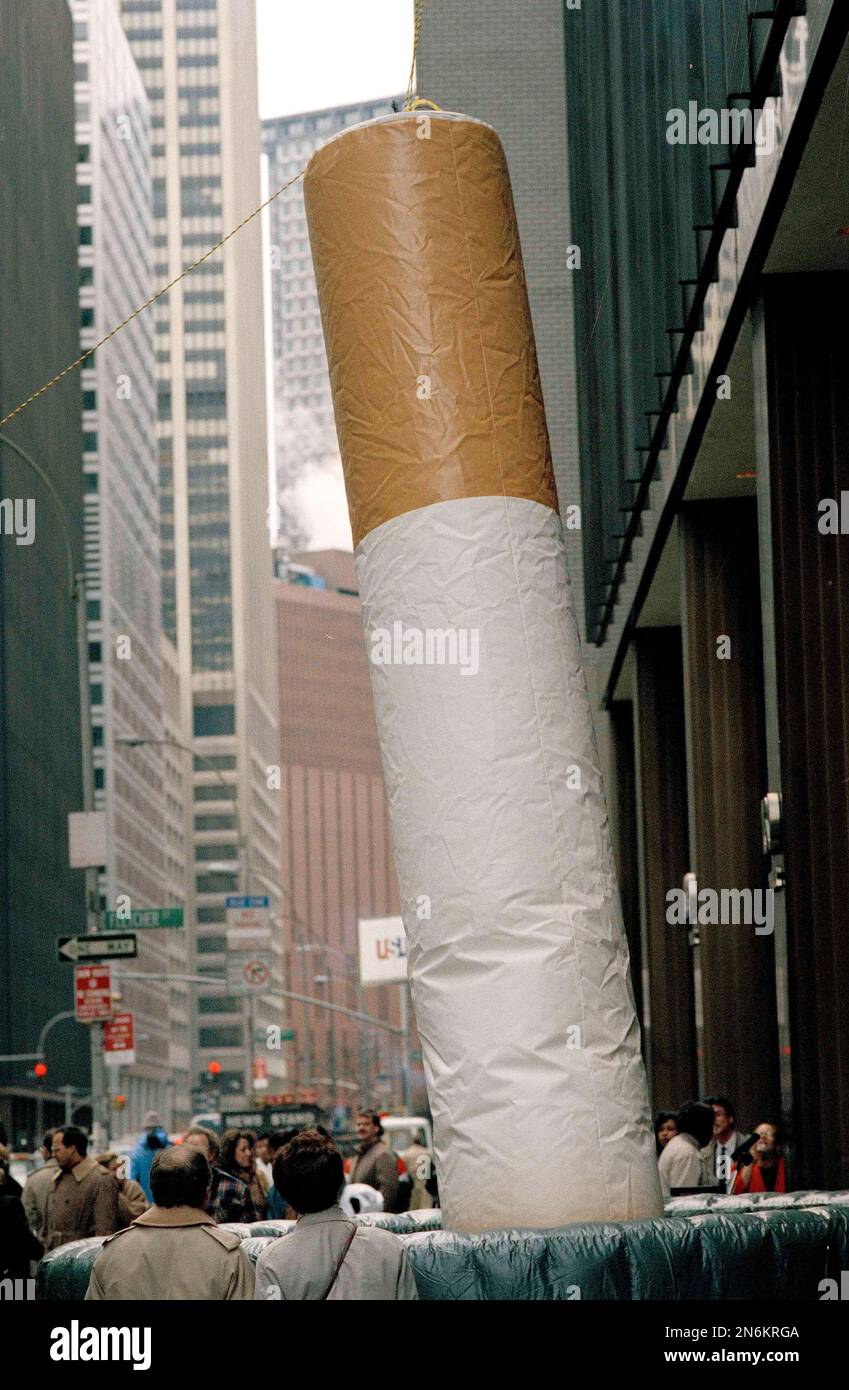 A 20-foot cigarette balloon is dropped from 160 Water Street in ...