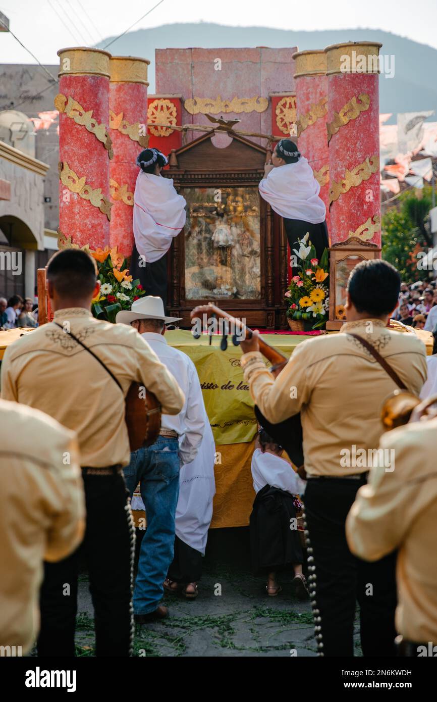 A music band performing music next to Jesus statue during the annual ...