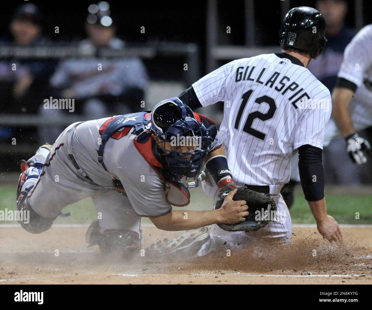 Minnesota Twins catcher Josmil Pinto left, attempts to tag Chicago ...