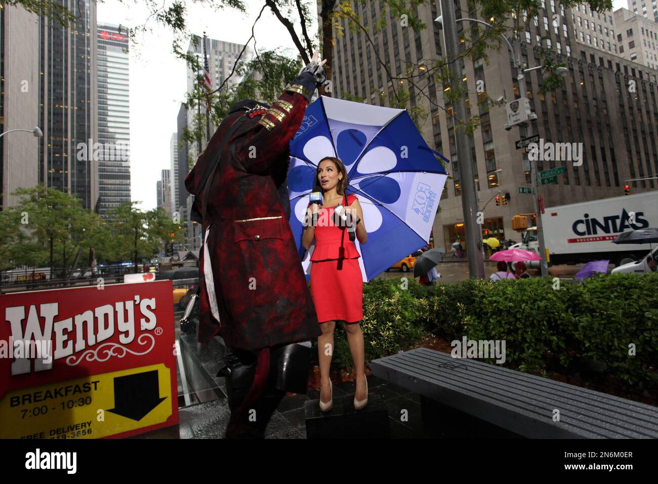 'FOX & Friends' weatherperson Maria Molina is surprised by the 7-foot ...
