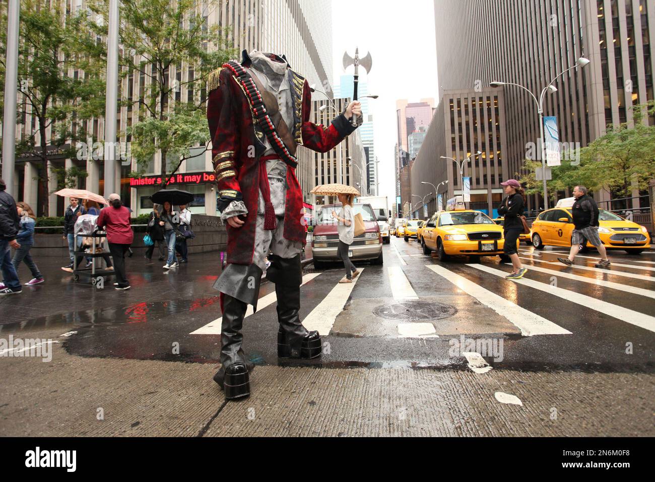 The 7-foot-tall Headless Horseman hails a taxi during FOX's 'Sleepy ...