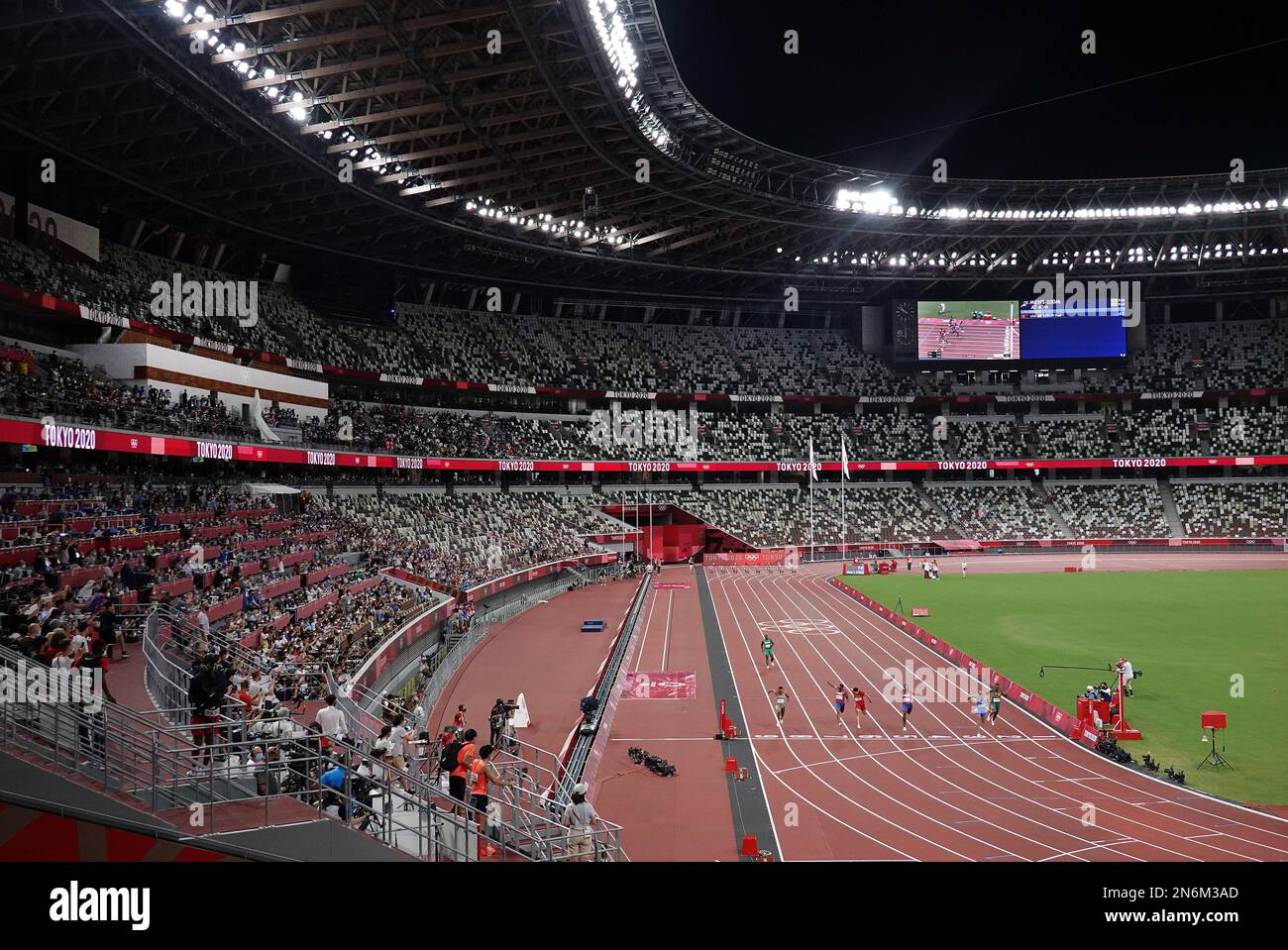 Lamont Marcell Jacobs (ITA) (lane 3) crosses the finish line to win the ...