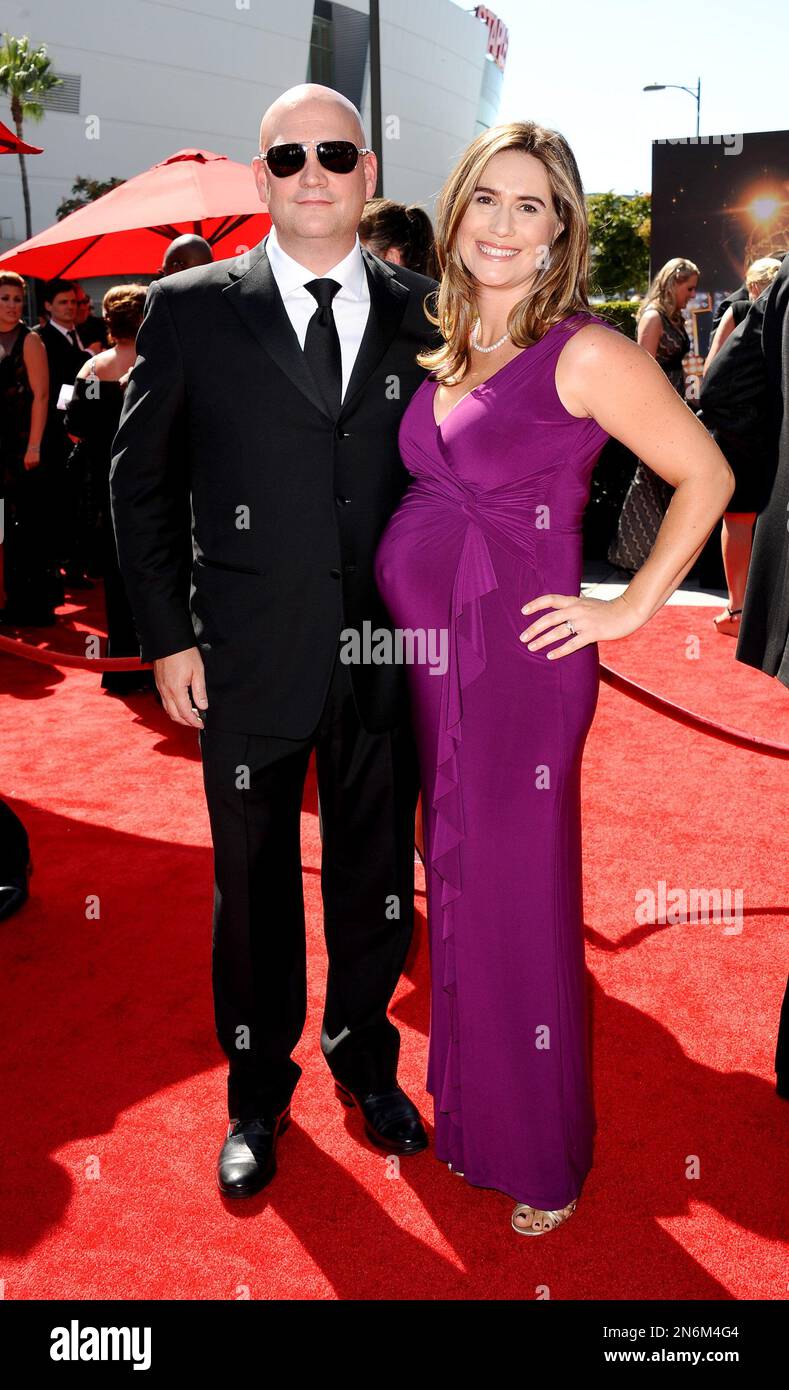 From left, Trevor Morris and guest arrive at the 2013 Primetime ...