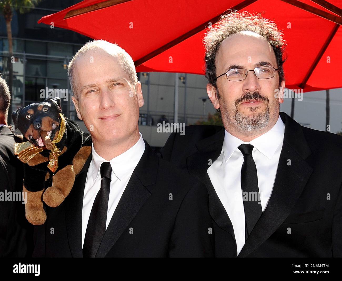 From left, Eric Slovin and Robert Smigel arrive at the 2013 Primetime ...