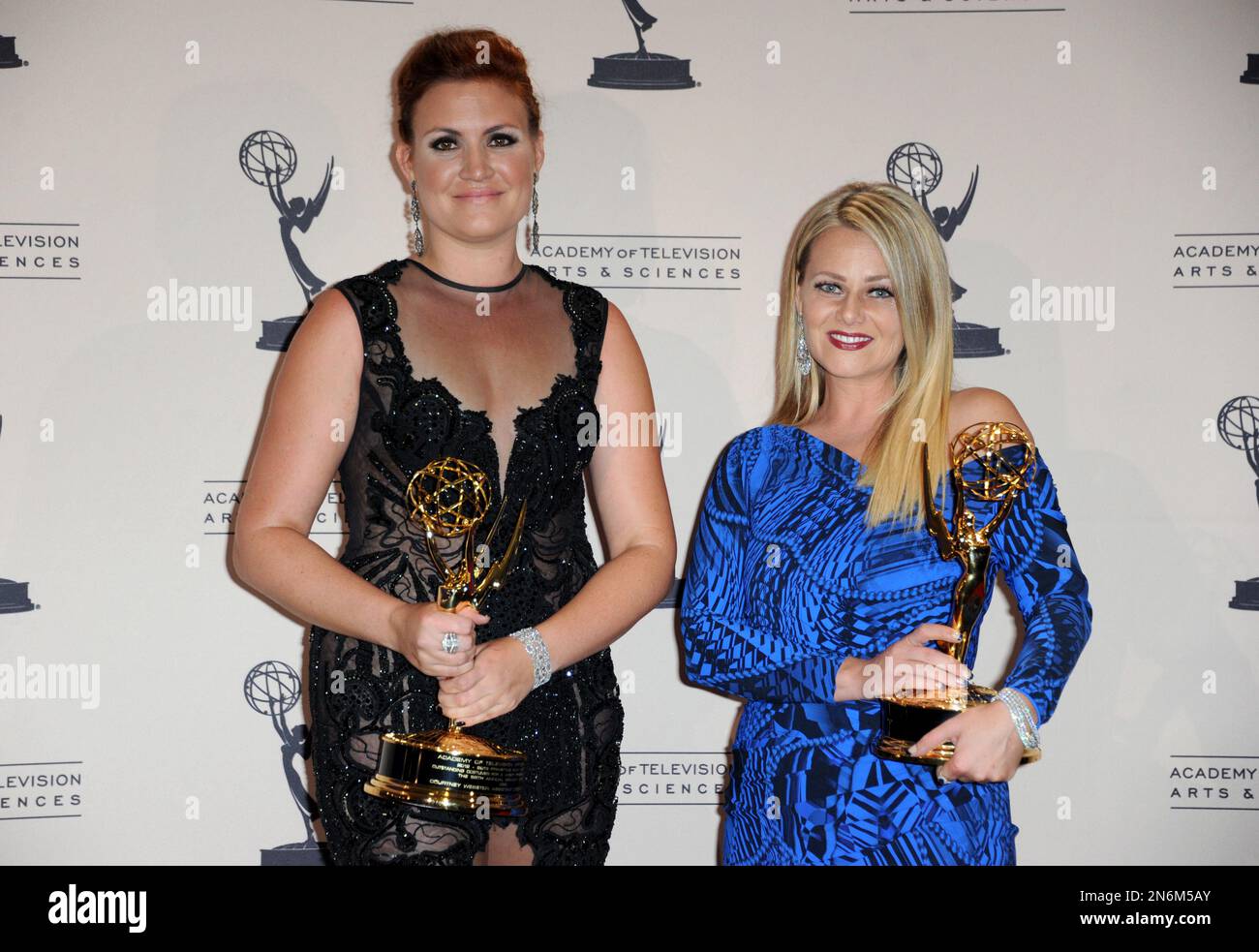 Courtney Webster, left, and Marina Toybina pose backstage with the ...