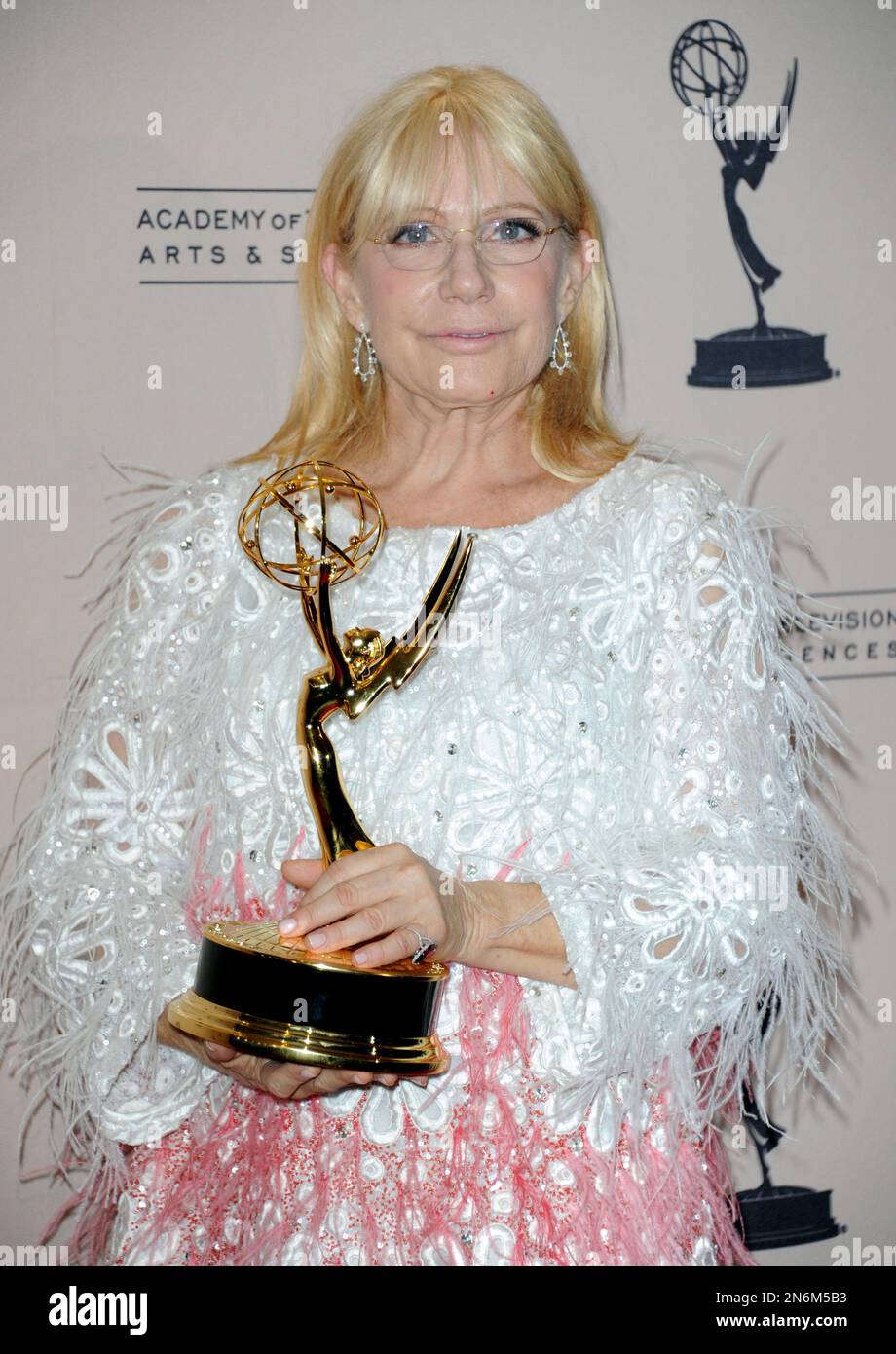 Ellen Mirojnick poses backstage with the award for outstanding costumes ...