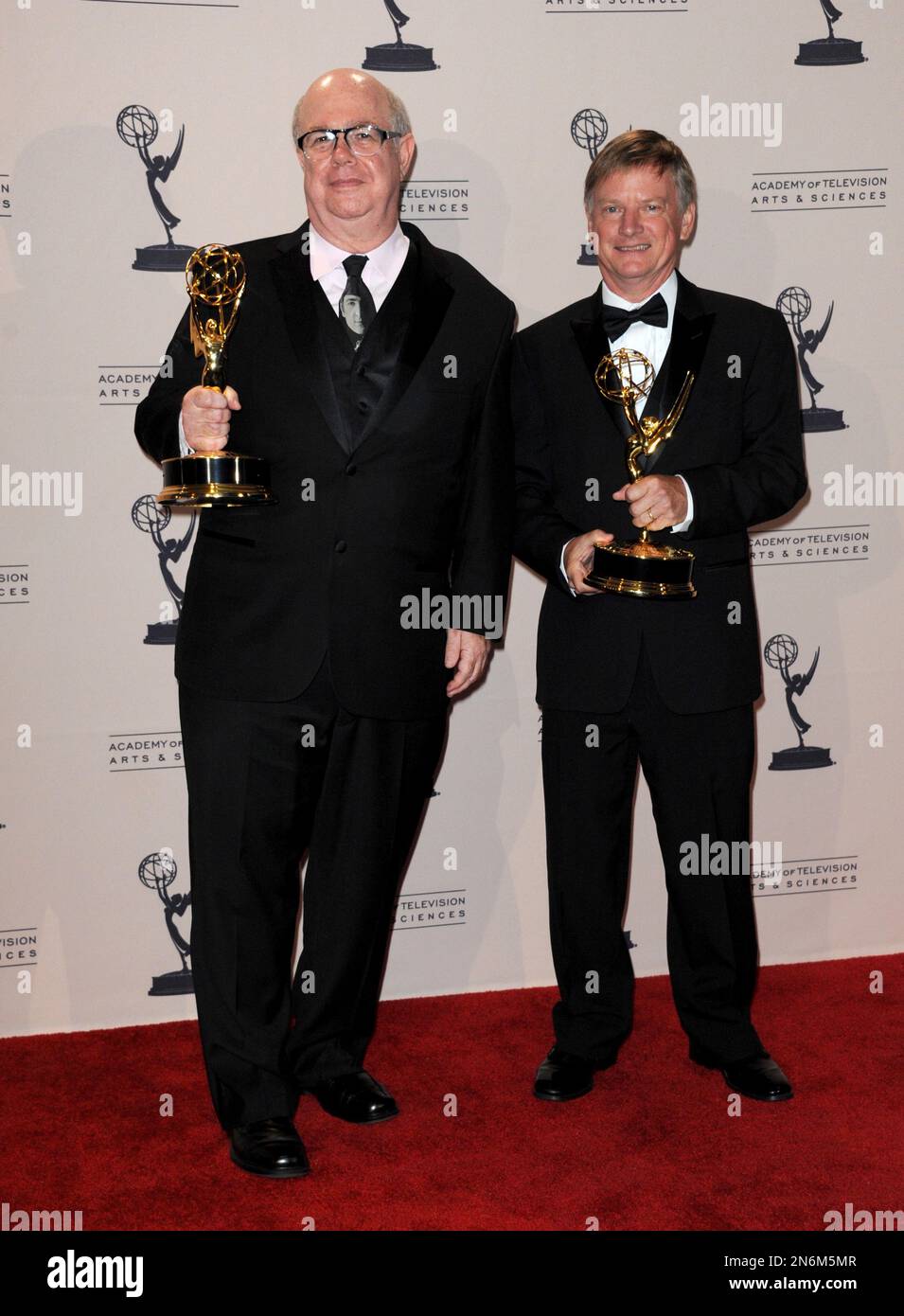 Larry Blake, left, and Dennis Towns, right pose backstage with their ...