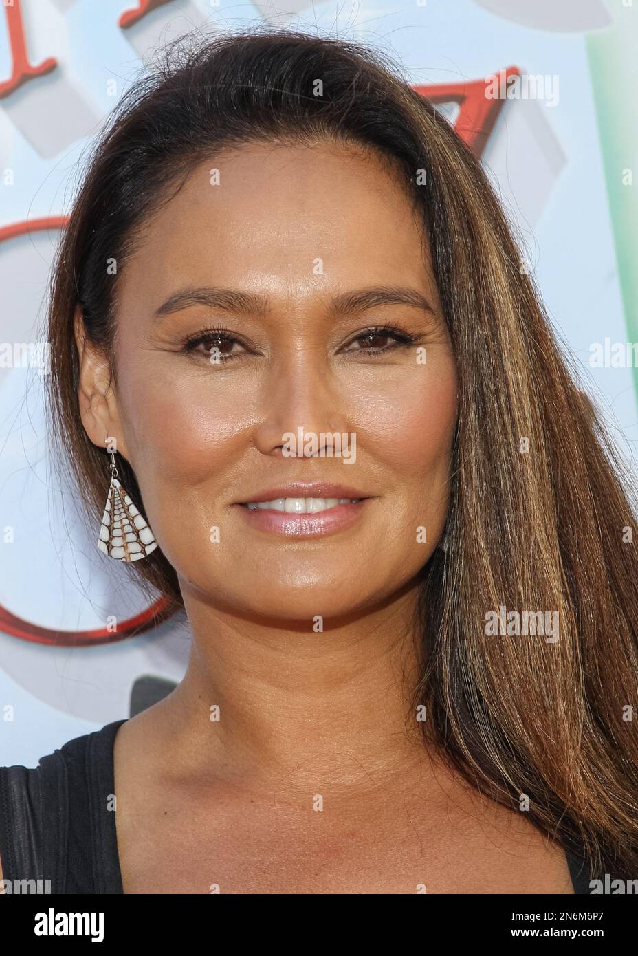 Actress Tia Carrere arrives at the world premiere of "Wizard of Oz" 3D ...
