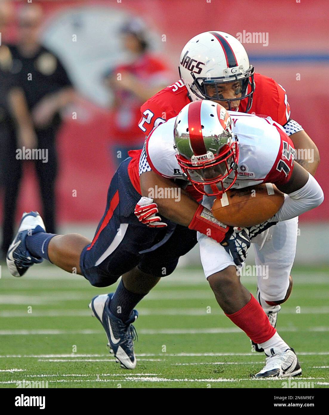 Western Kentucky wide receiver Nicholas Norris (15) is tackled by South ...
