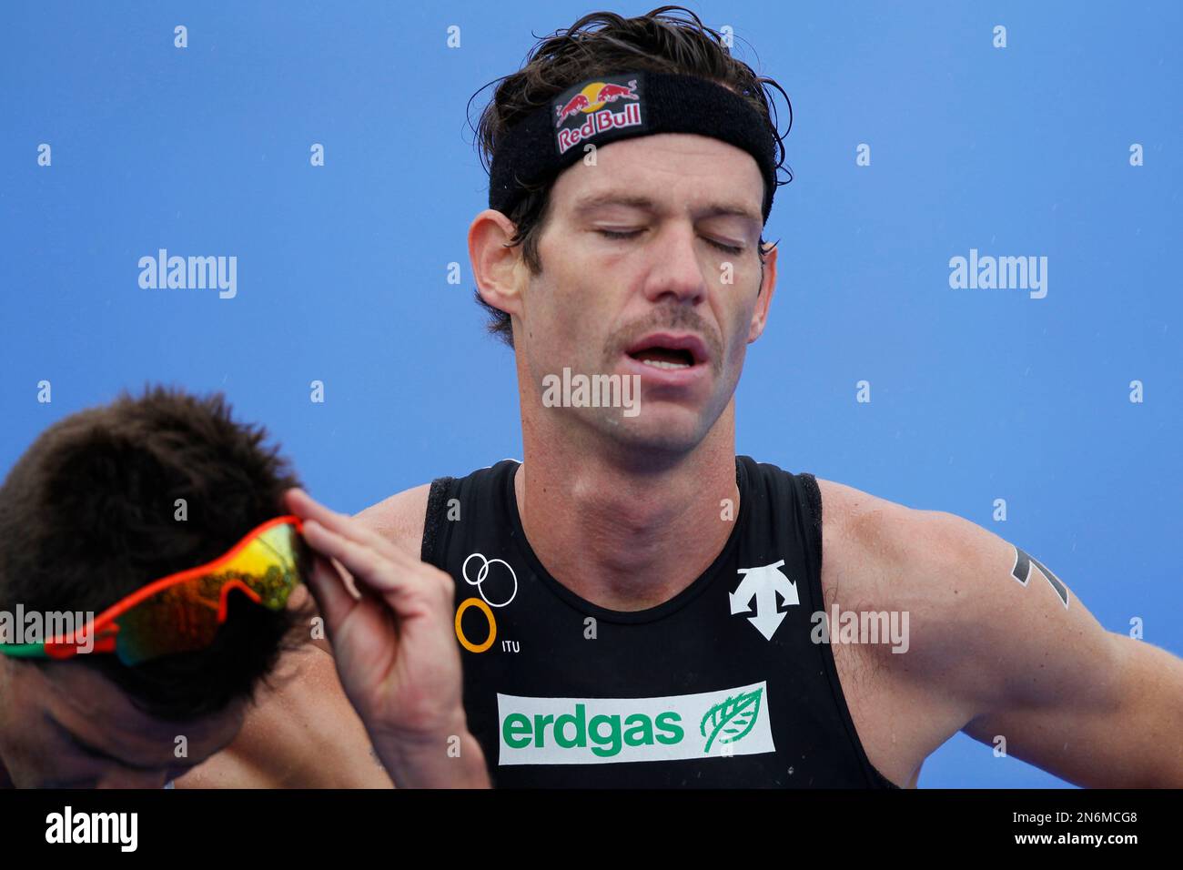 Sven Riederer of Switzerland reacts as he finishes the elite men race ...