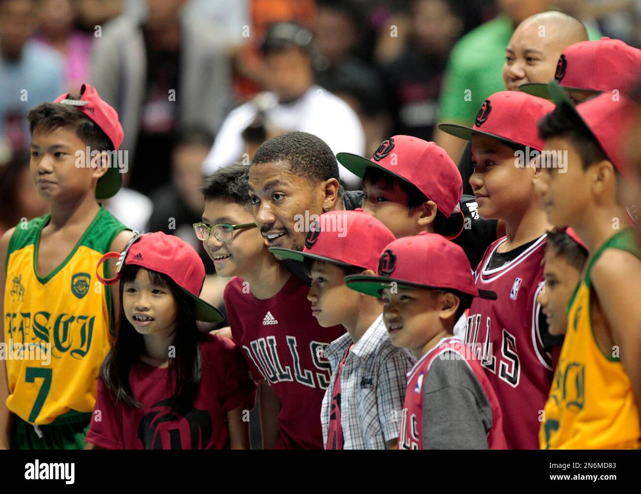 NBA player Derrick Rose of the Chicago Bulls, fourth from left, has a ...