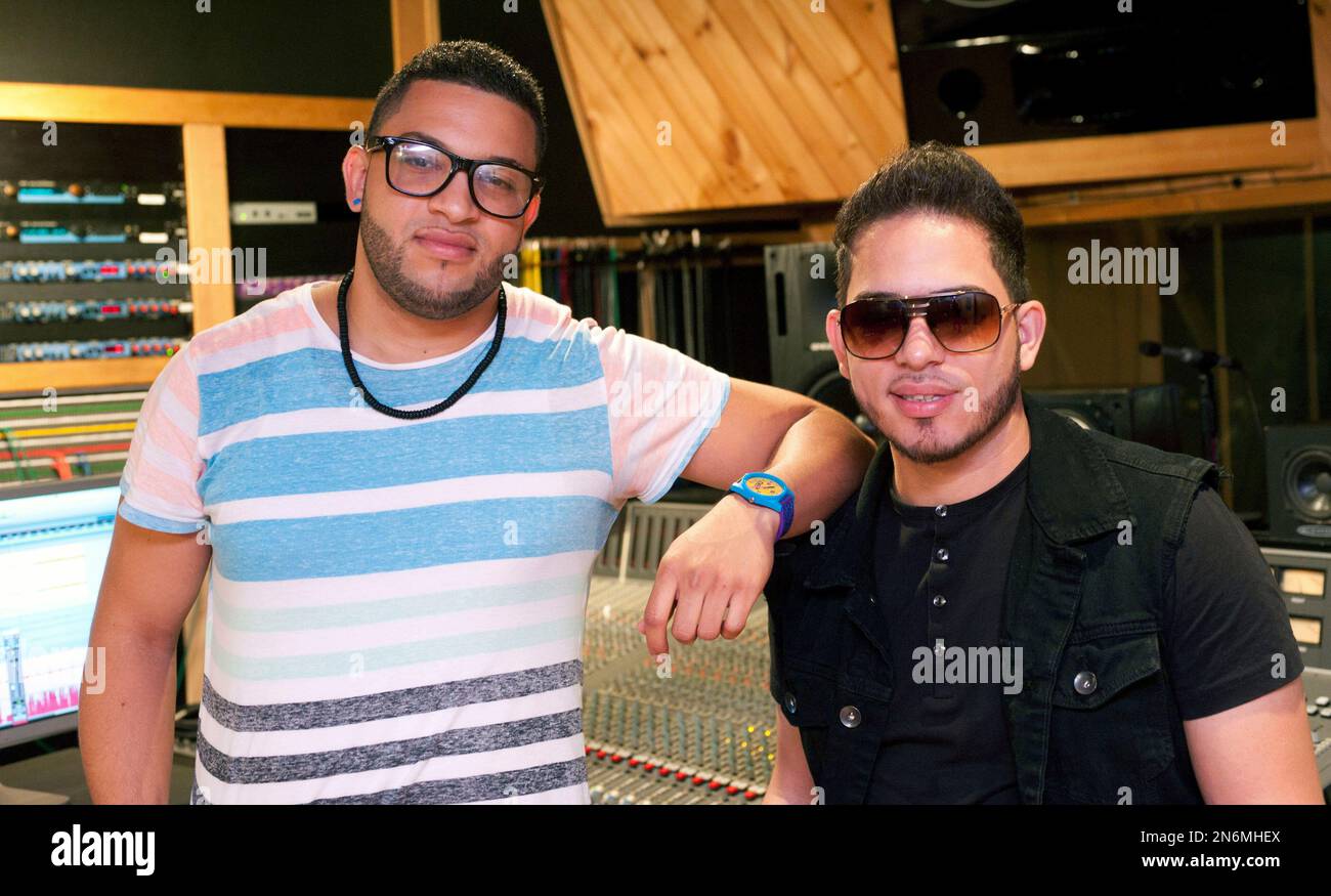 In this Sept. 12, 2013 photo, Alcover, right, and Xtassy, better known ...