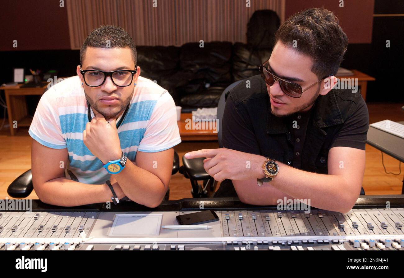 In this Sept. 12, 2013 photo, Alcover, right, and Xtassy, better known ...