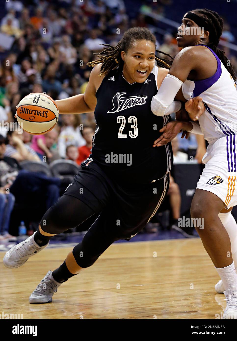 San Antonio Silver Stars' Danielle Robinson (23) drives past Phoenix ...