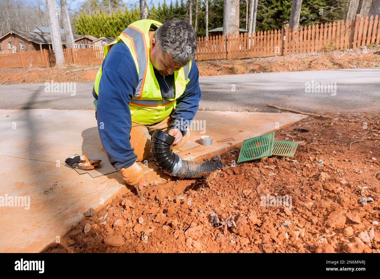 Installation of rainwater drainage system assembly by plumber Stock ...