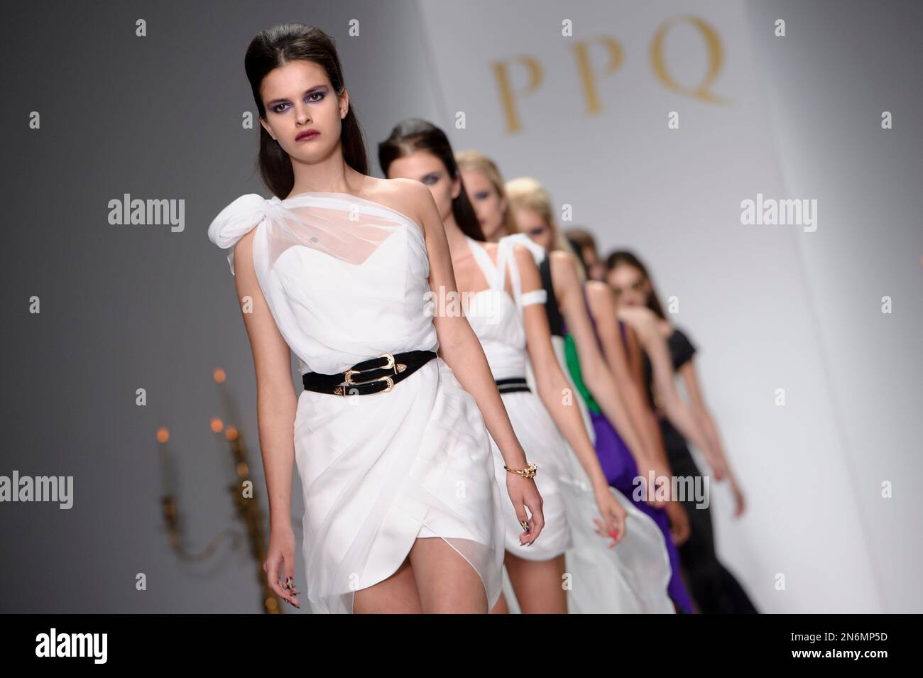 Modles wear a design created by PPQ during London Fashion Week Spring ...