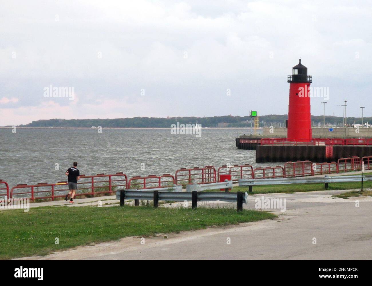 In this Sept. 12, 2013 photo a jogger runs along Milwaukee’s Inner ...