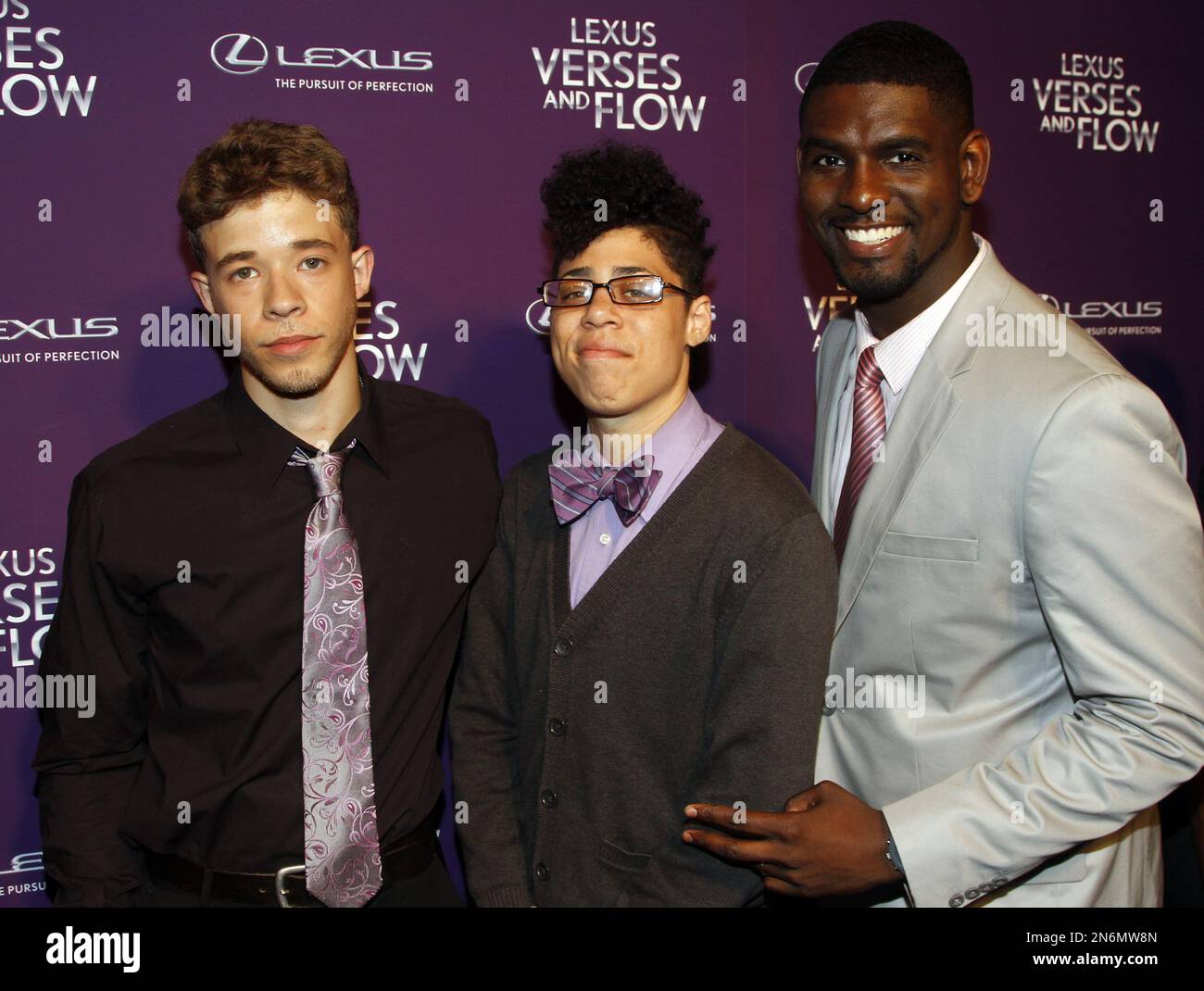 (L-R) poets Miles Hodges, Storm Thomas and Carvens Lissaint arrive at ...