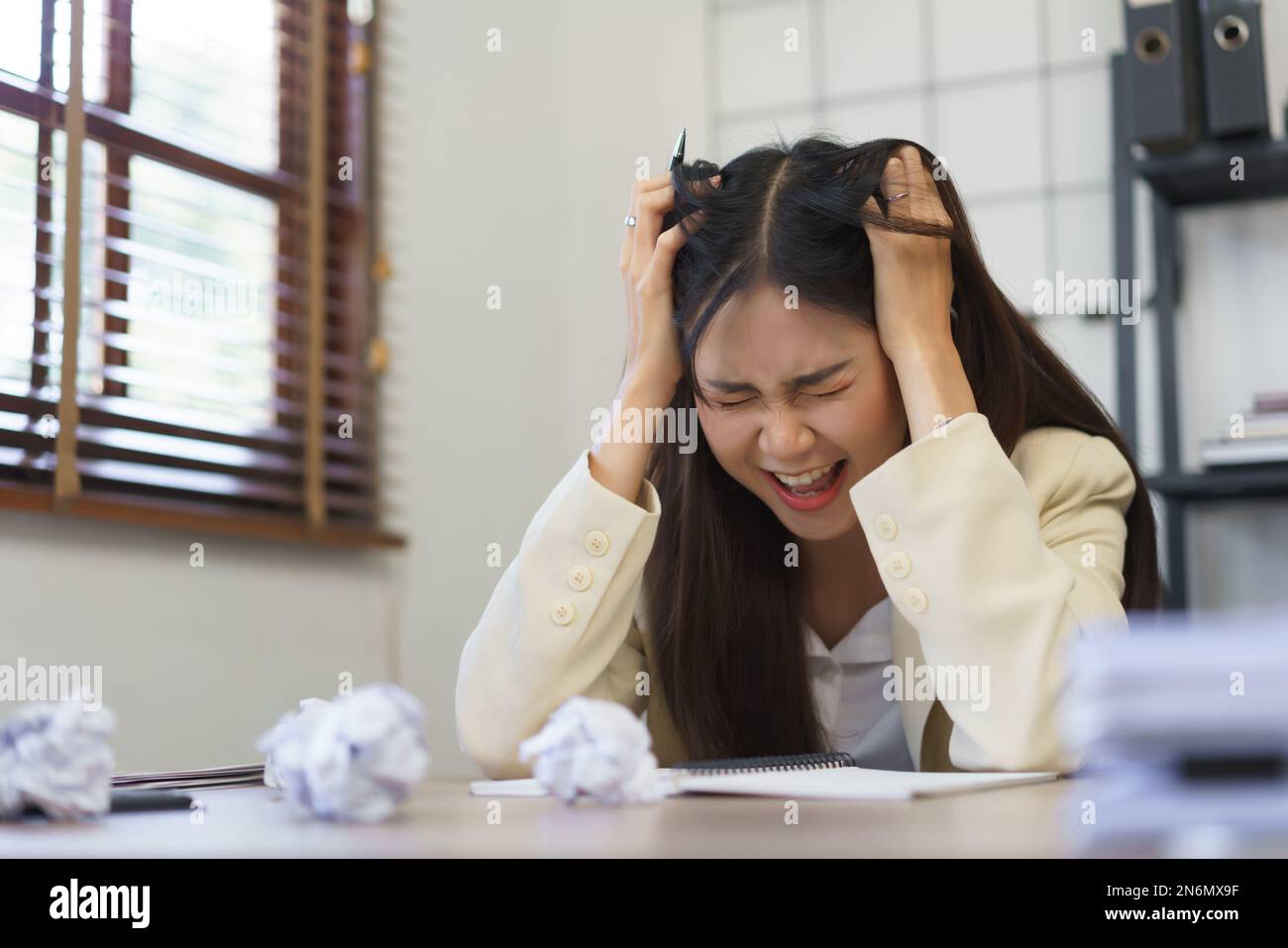 Secretary concept, Female secretary screaming and put hands on head ...