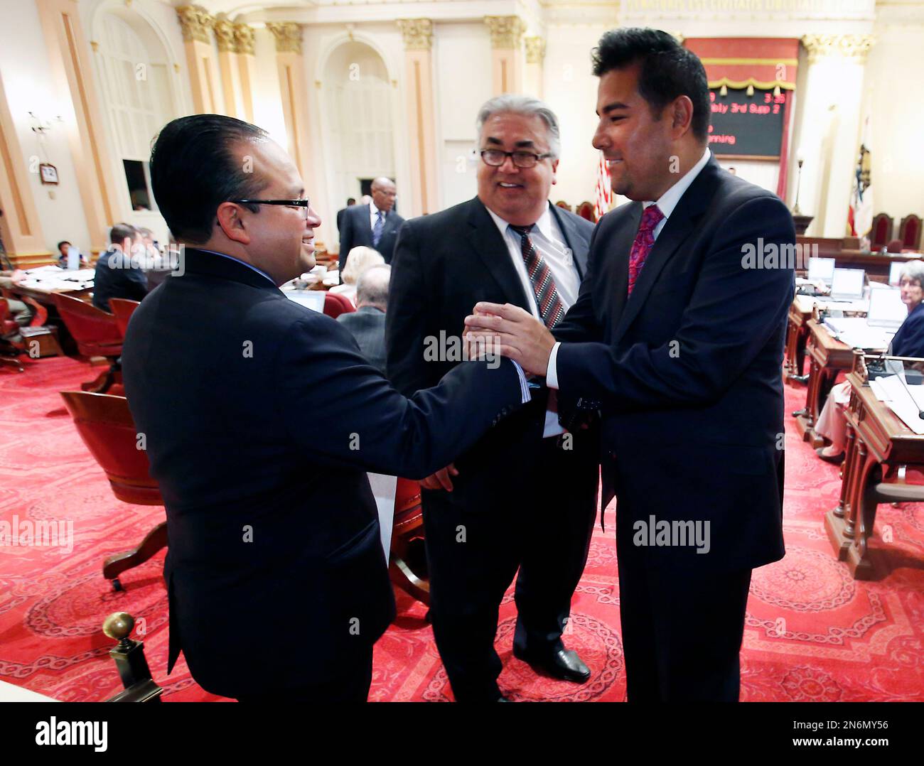 Assemblyman Luis Alejo, D-Watsonville, left, is congratulated by ...