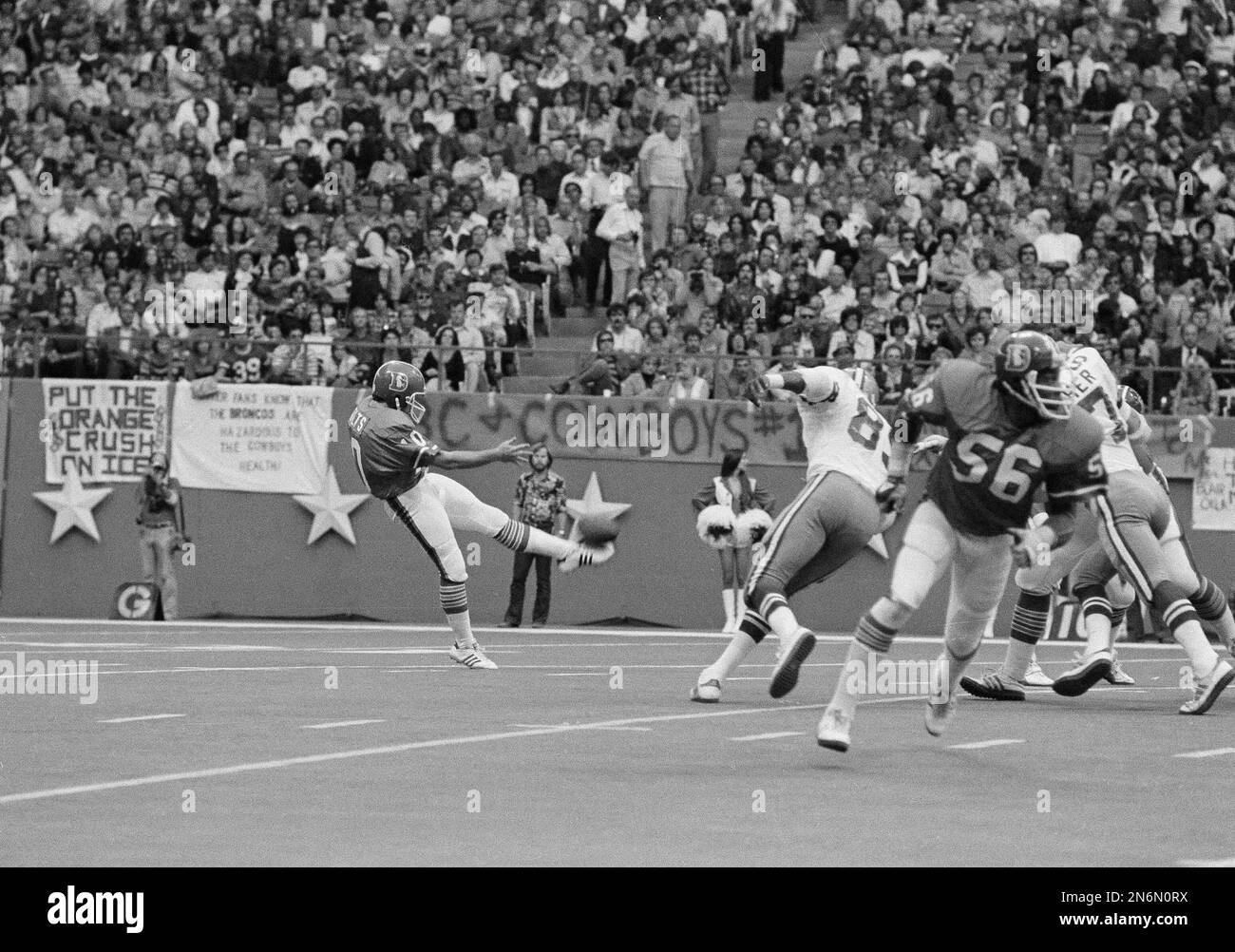 Douglas Riggs "Bucky" Dilts punts for Denver Broncos against Dallas ...