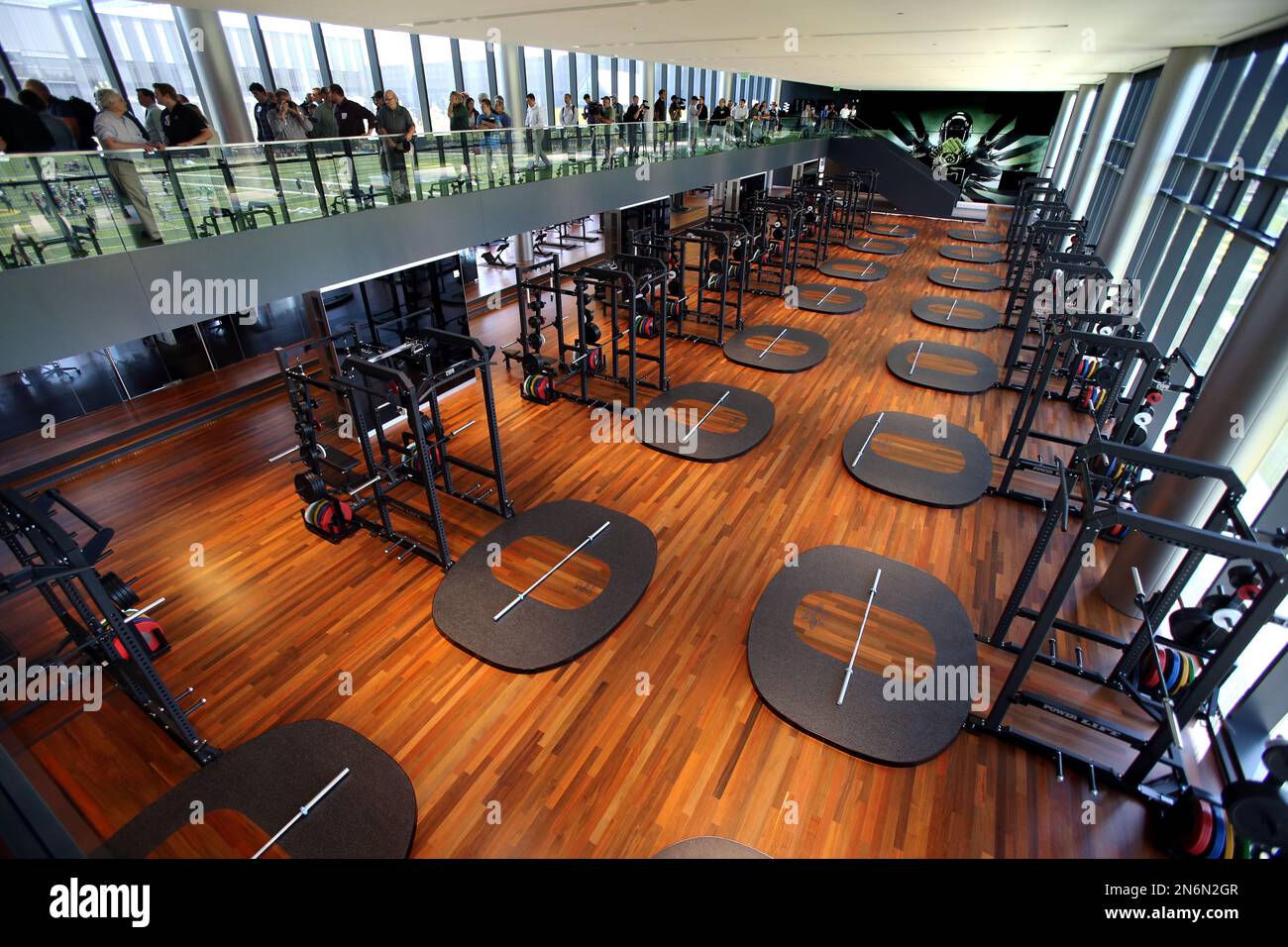 In this Aug. 5, 2013 photo, members of the media tour the 25,000-square ...