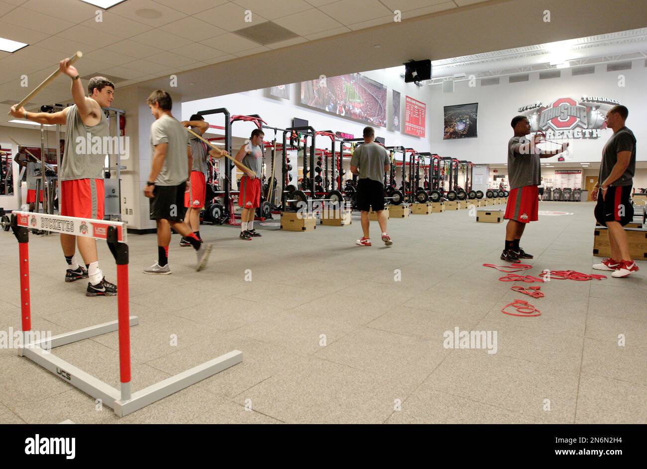 In this Aug. 30, 2013 photo, Ohio State football players train in the ...