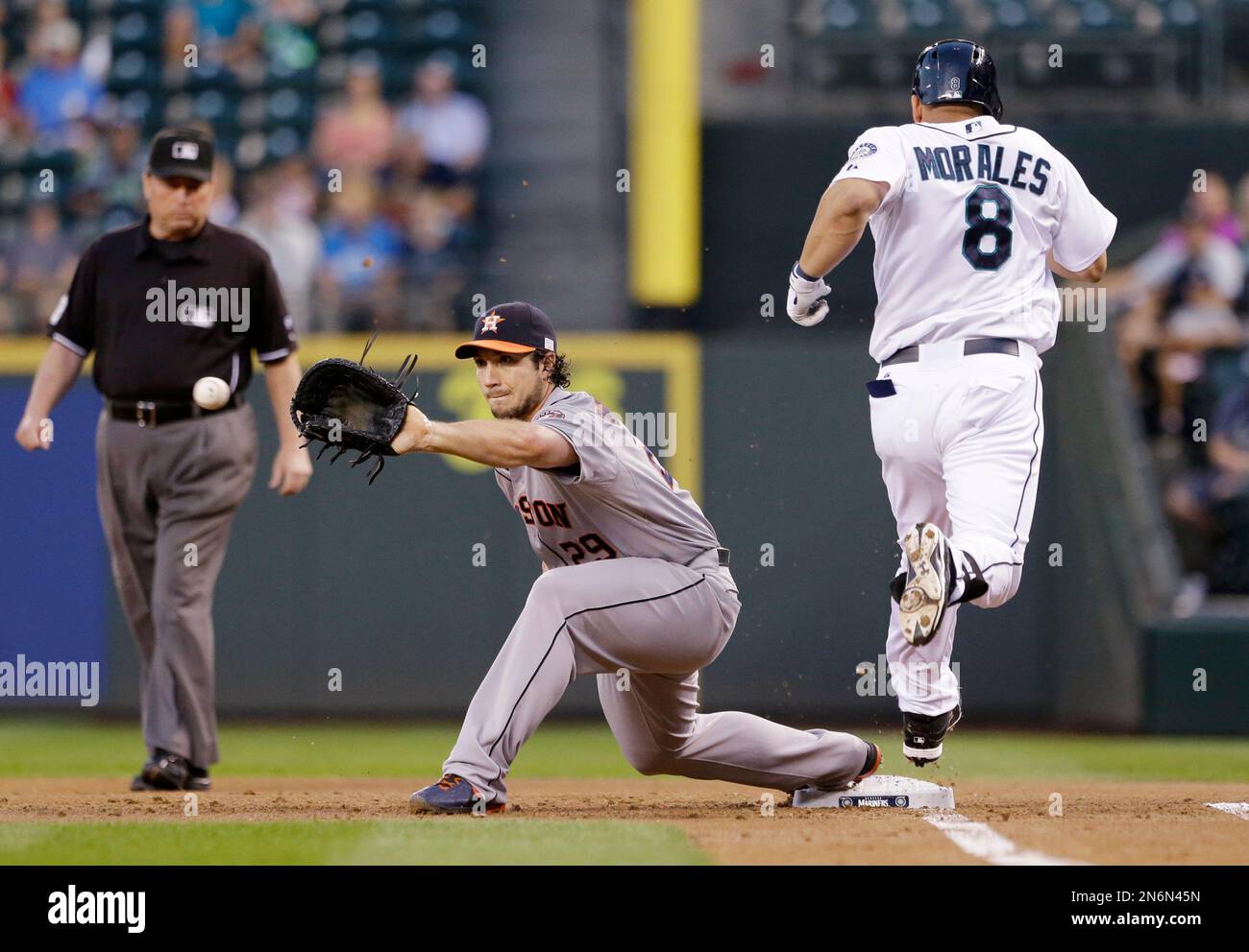 Houston Astros first baseman Brett Wallace stretches for the ball as ...