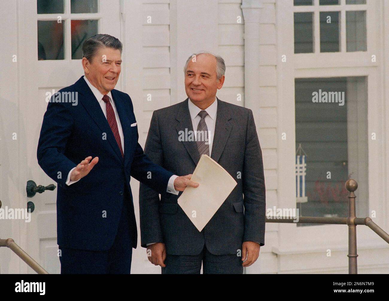 U.S. President Ronald Reagan gestures as Soviet leader Mikhail ...