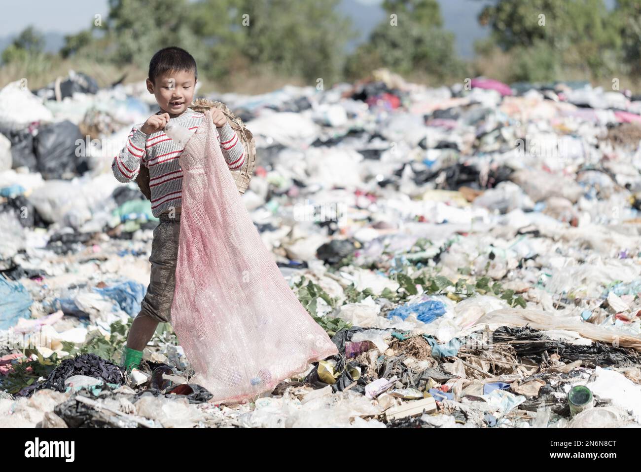 Poor children collect garbage for sale because of poverty, Junk recycle ...