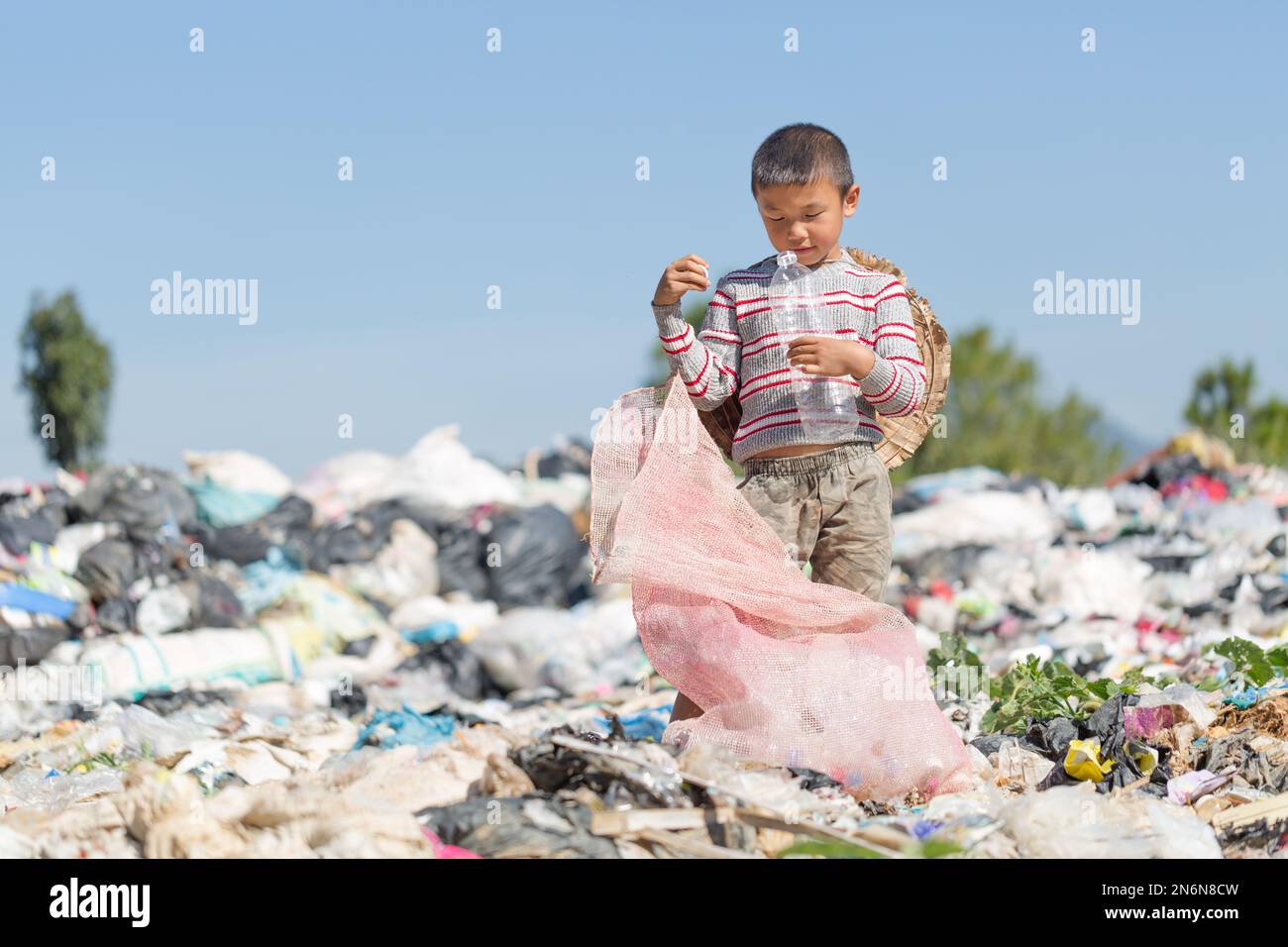 Poor children collect garbage for sale because of poverty, Junk recycle ...