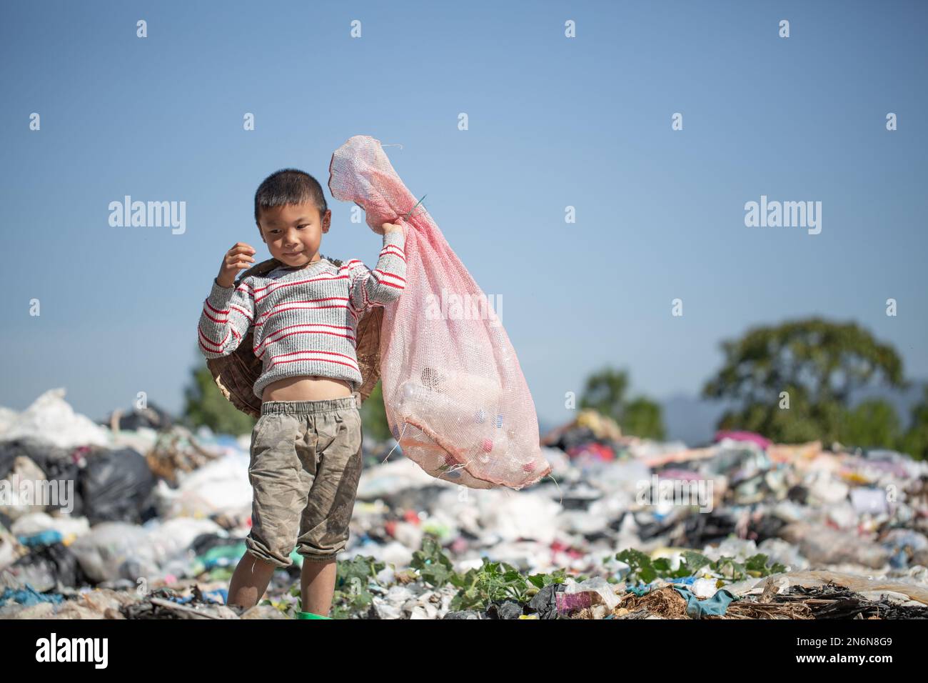 Poor children collect garbage for sale because of poverty, Junk recycle ...