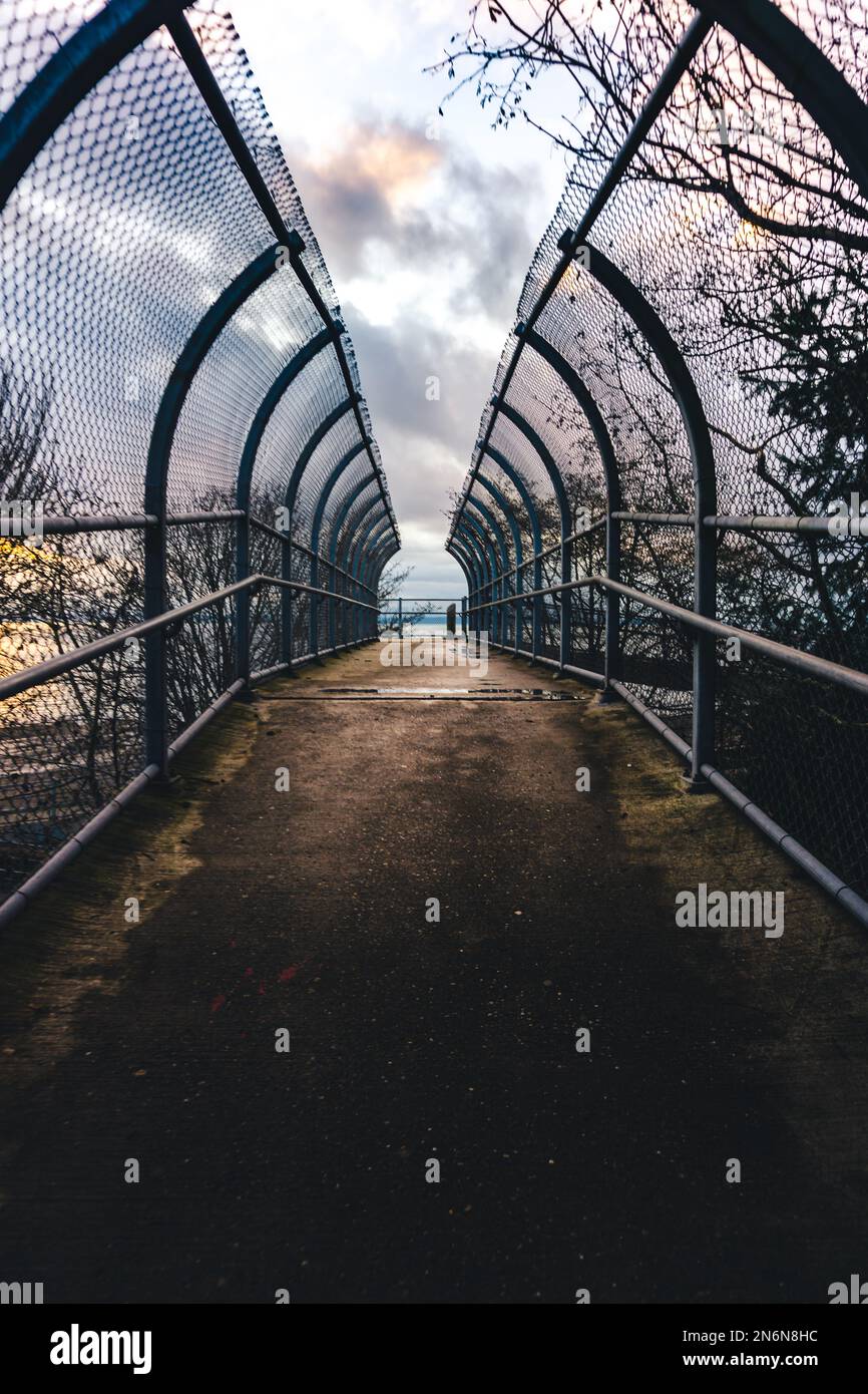 A walking bridge over railroad tracks Stock Photo - Alamy