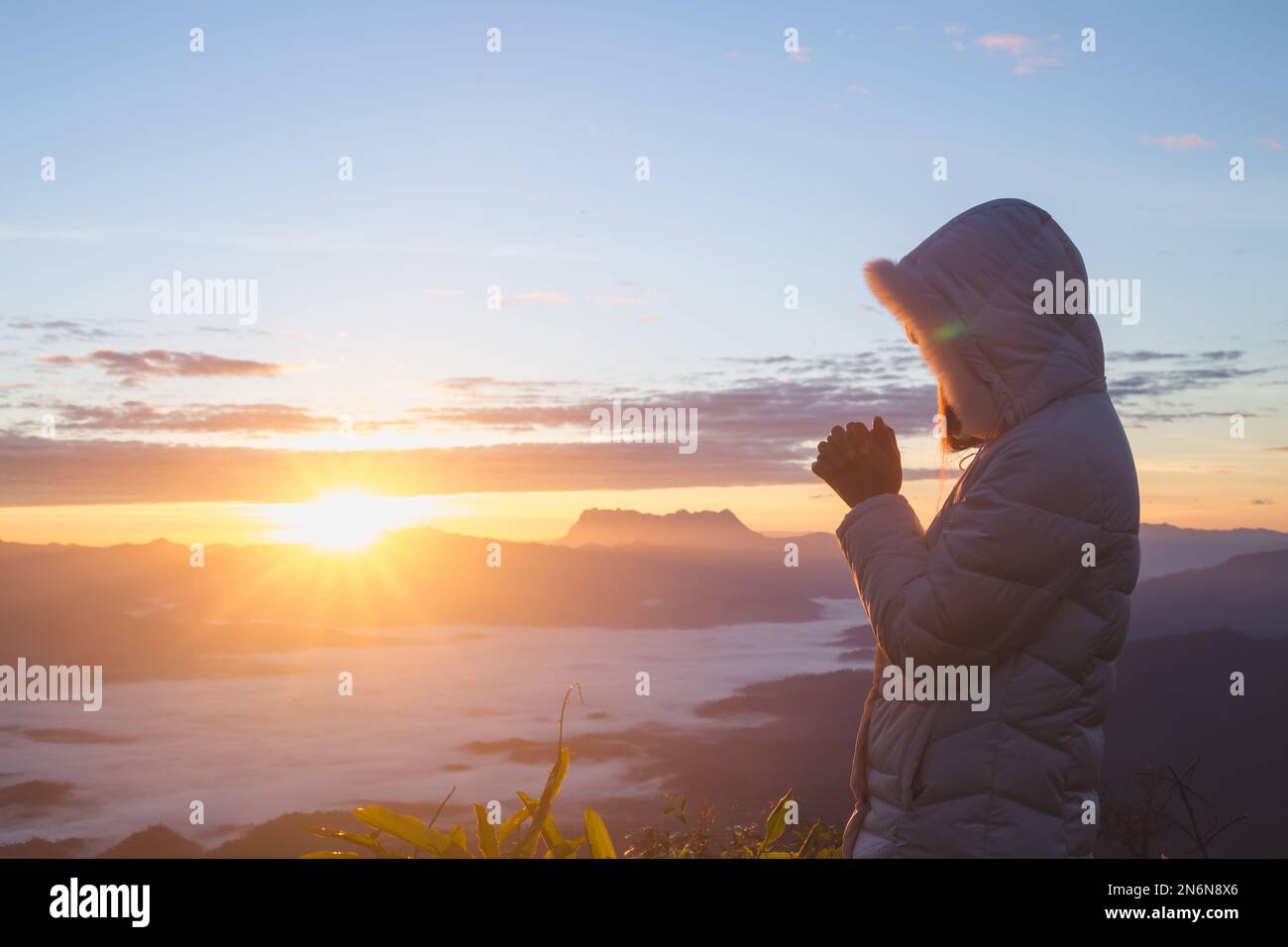 Pray in the Morning , Woman praying with hands together on the morning ...