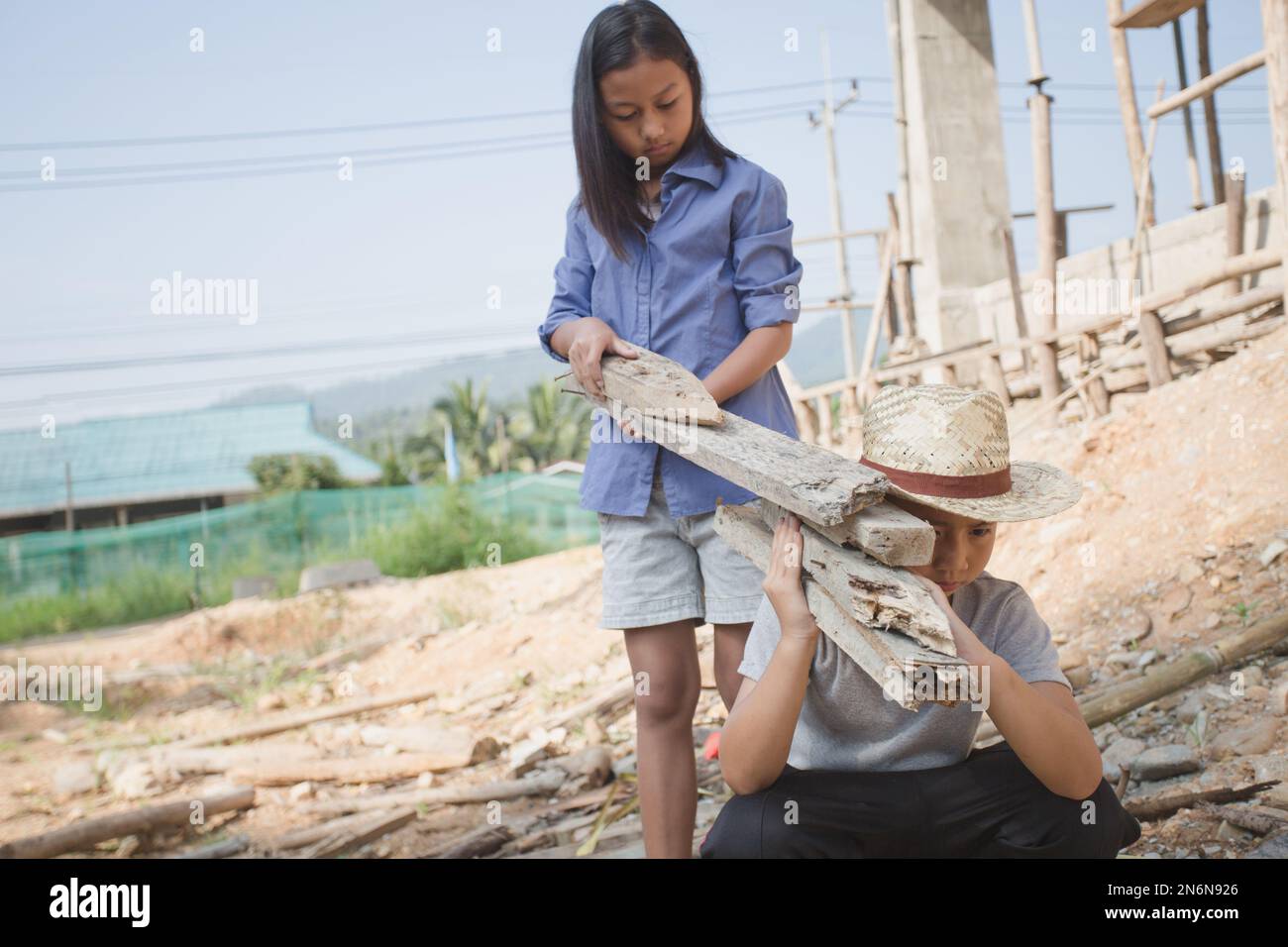 Poor children working at construction site against children labour ...