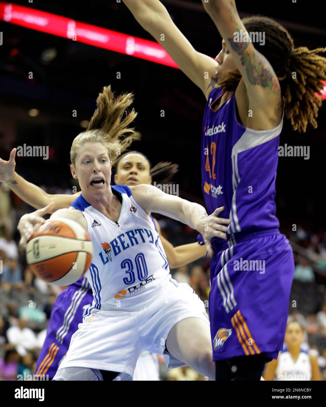 New York Liberty's Katie Smith (30) passes the ball as Phoenix Mercury ...