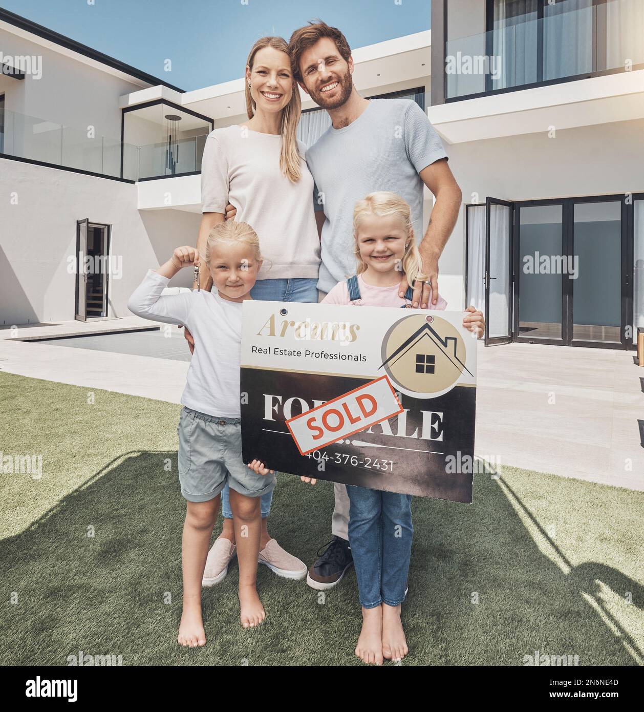 Real estate, sign and portrait of family with keys moving advertisement ...